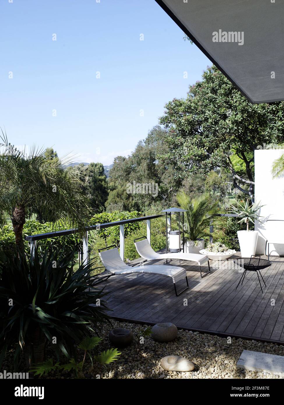 Terrace with decking and sun loungers in, California, USA Stock Photo ...