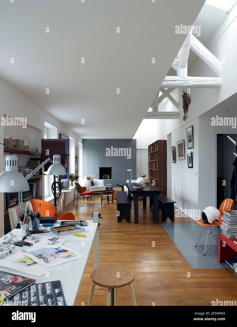 Open plan study, dining and living area with beamed ceiling in French ...