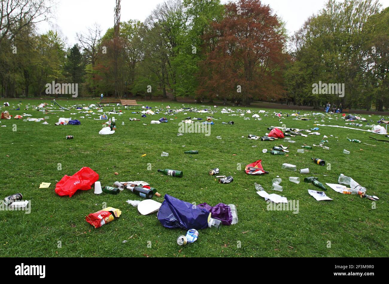 Littering in a park after some kind of celebration Stock Photo - Alamy