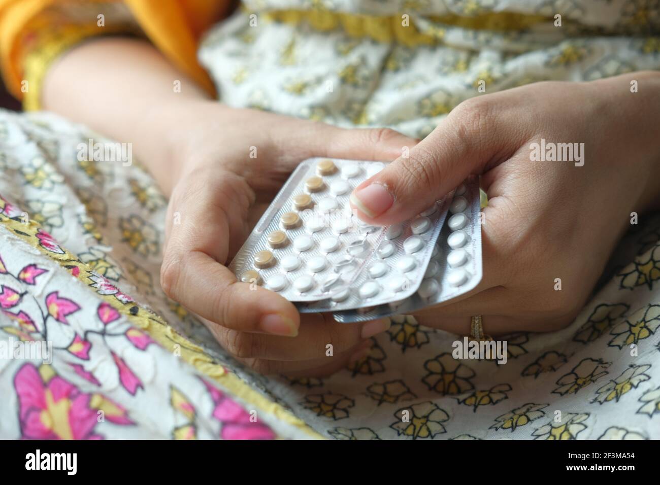 Women hand golding birth control hi-res stock photography and images ...