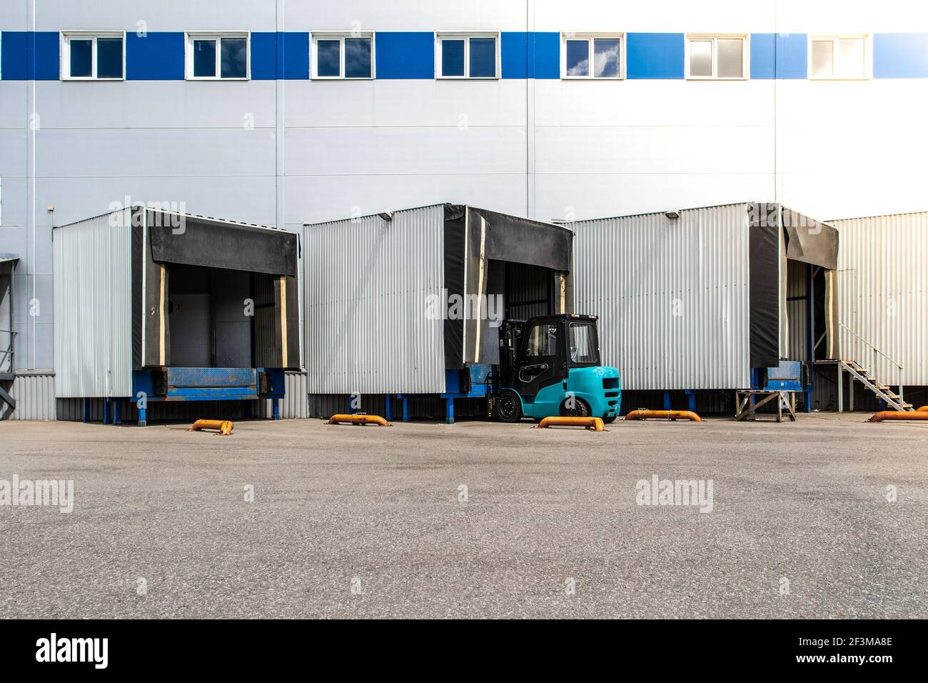 General view to the loading gates in the big distribution warehouse ...