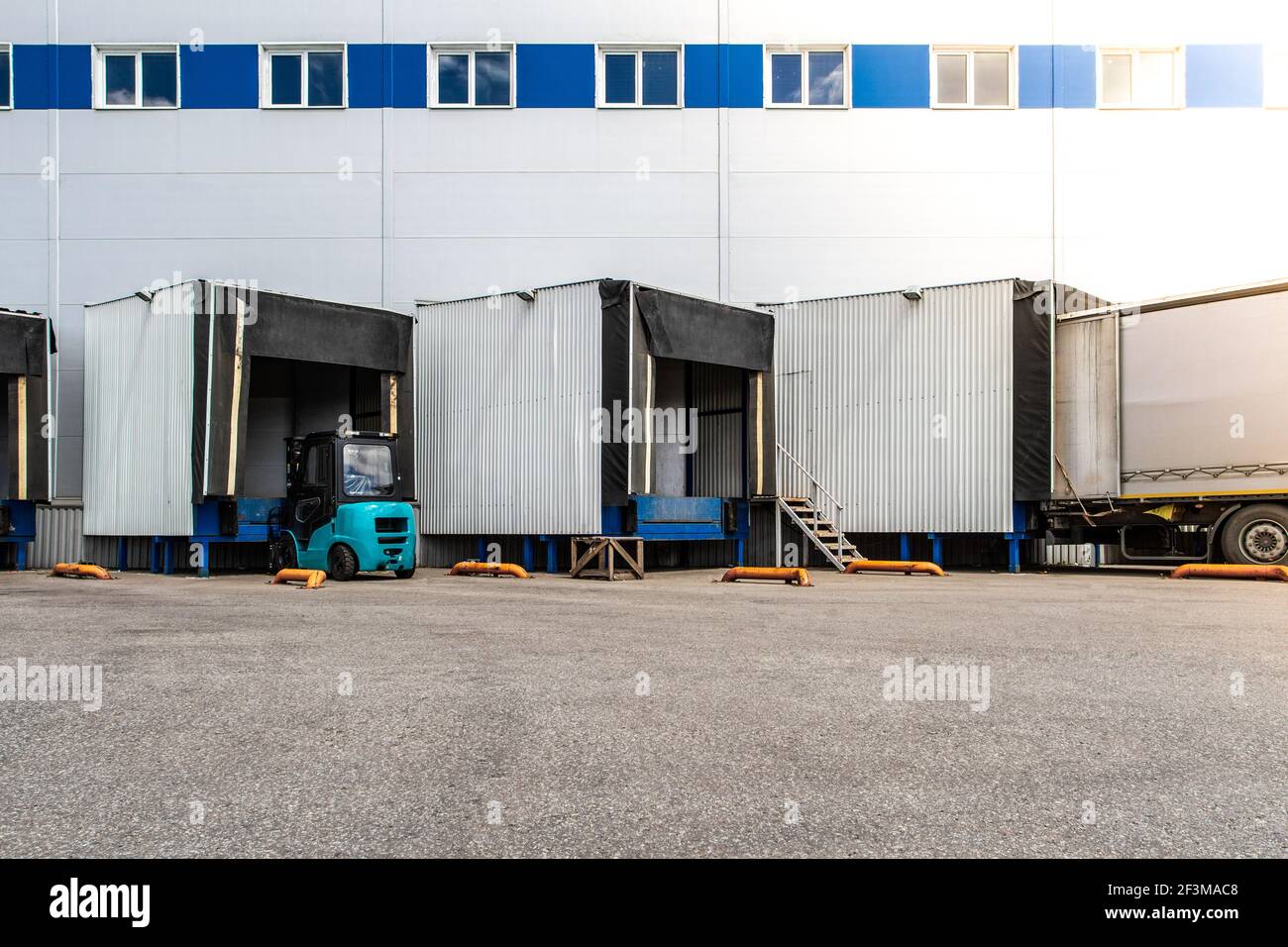 General view to the loading gates in the big distribution warehouse ...