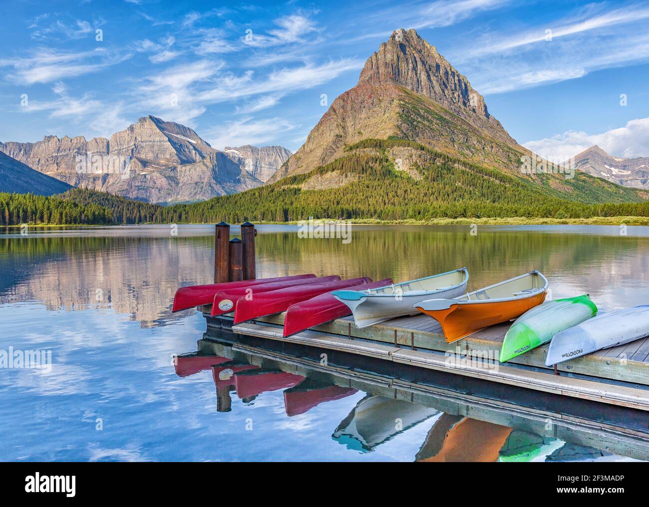Boats at Swiftcurrent Lake Stock Photo - Alamy
