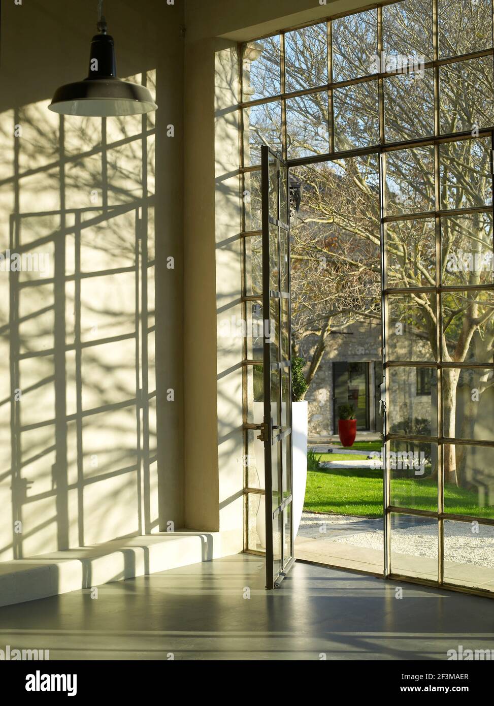 Modern glass entrance door to French villa Stock Photo - Alamy