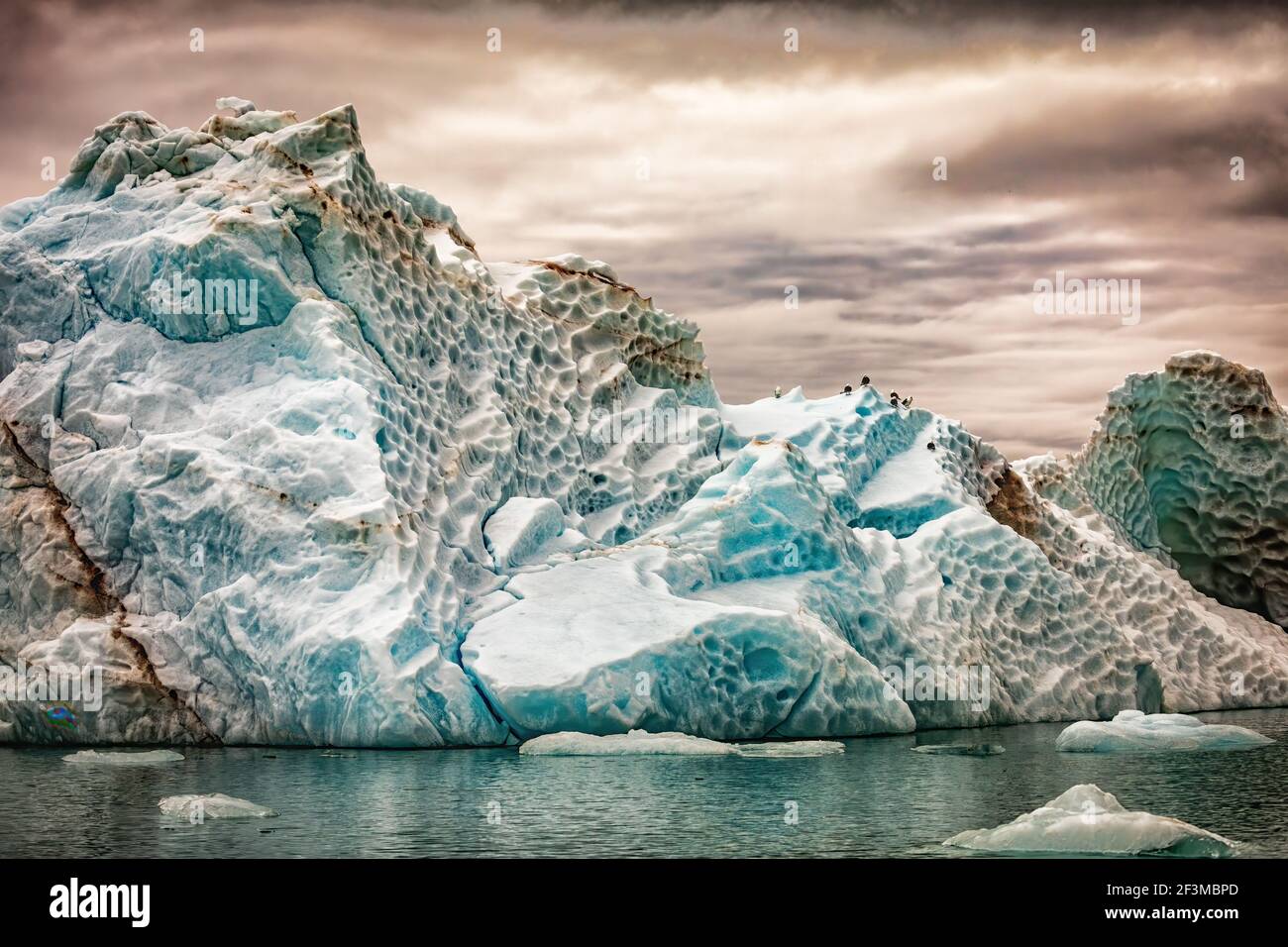 Blue iceberg in Svalbard Stock Photo - Alamy