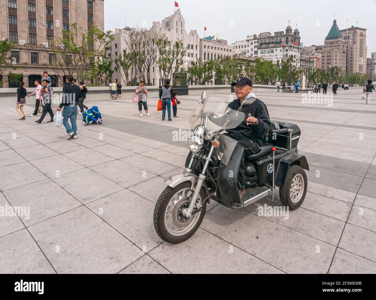 Old man riding tricycle along hi-res stock photography and images - Alamy