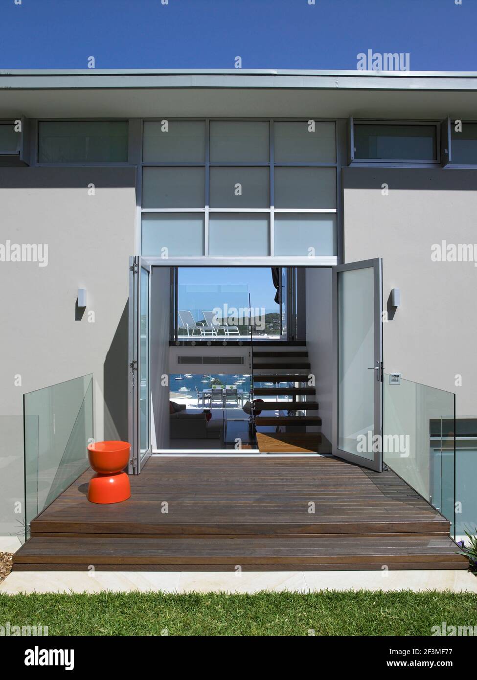 Entrance with glass doors to Lauderdale house, Australia Stock Photo ...
