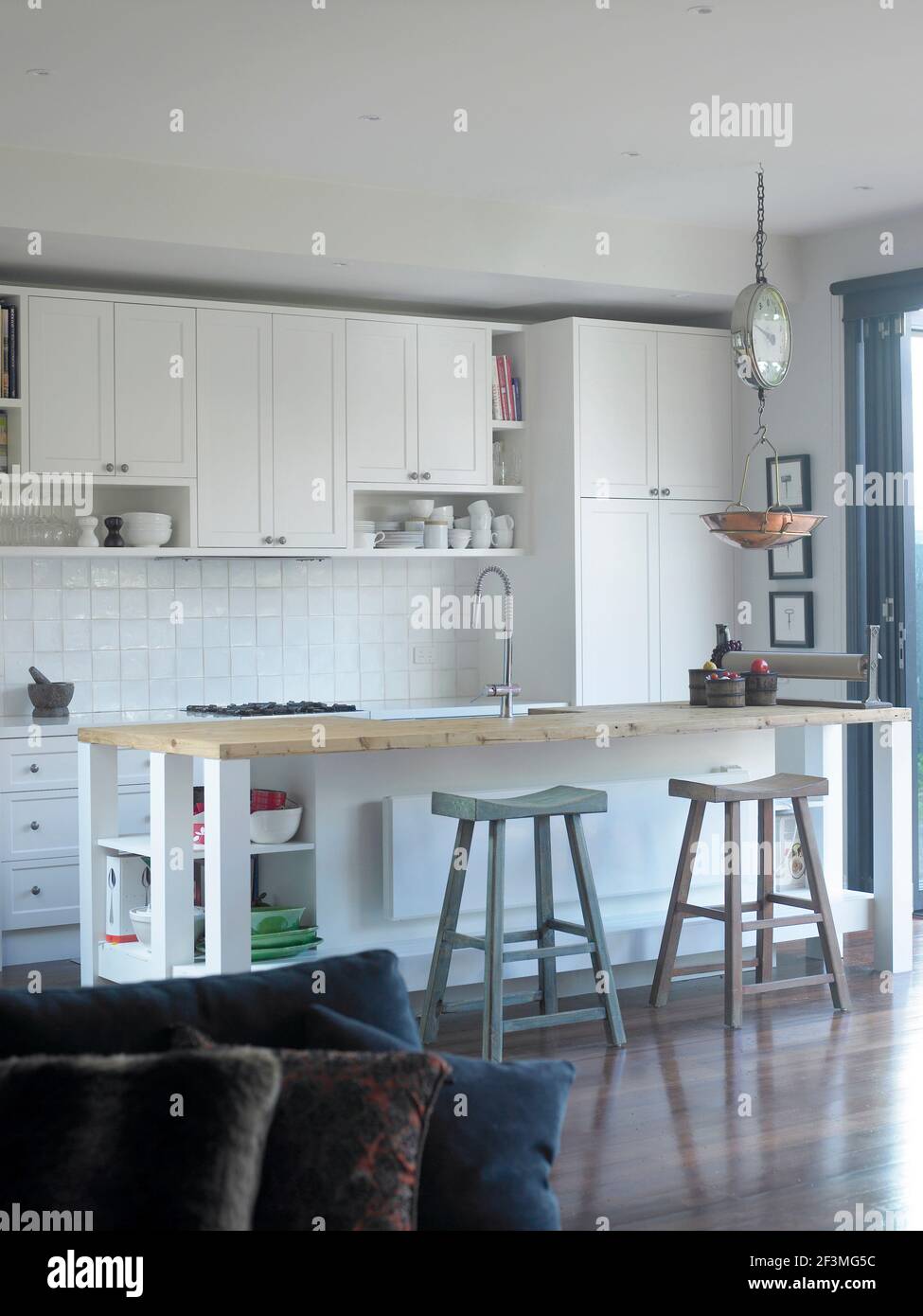 Breakfast bar in open plan kitchen of residential home, Australia Stock ...