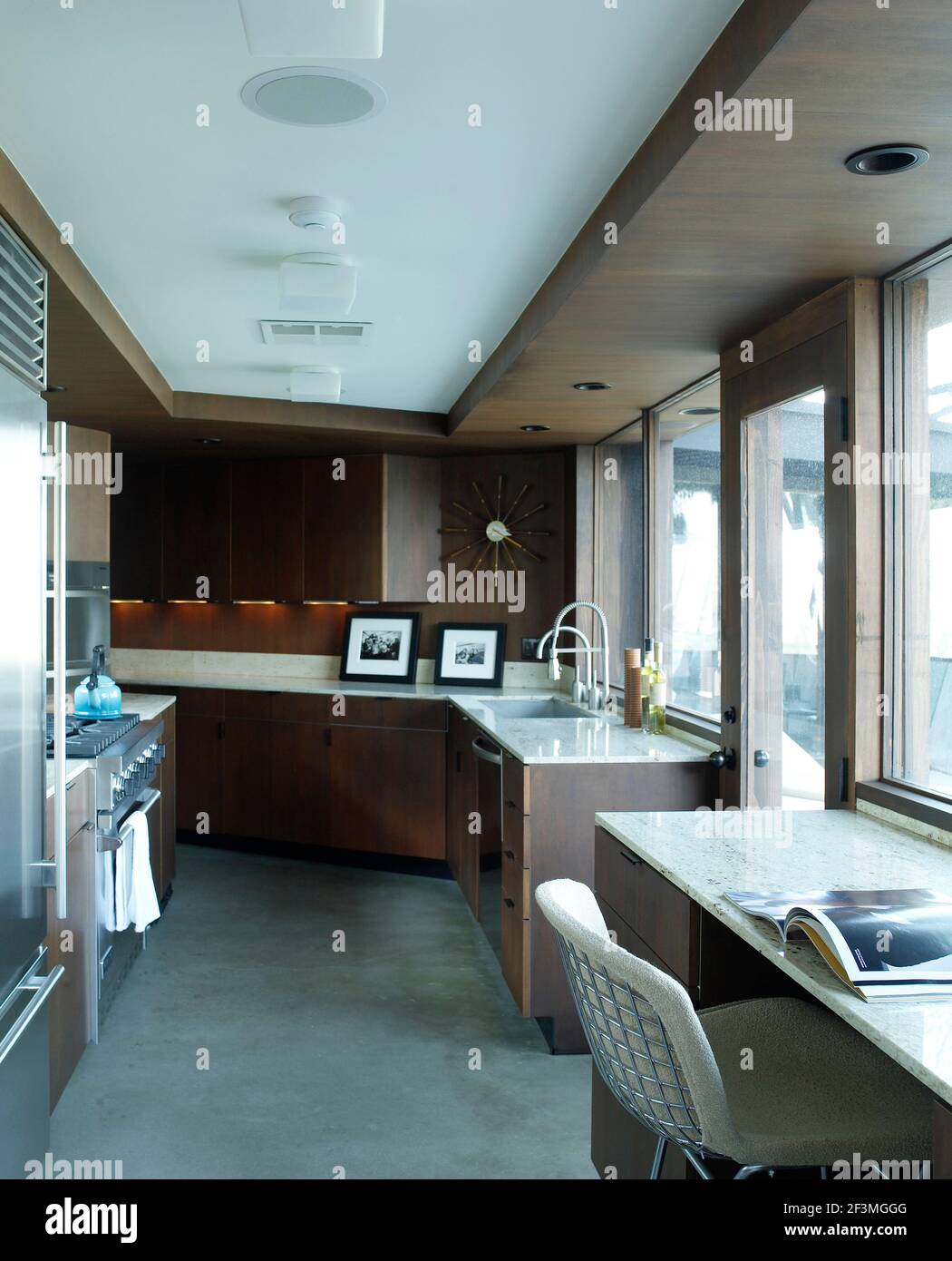 Modern kitchen with uncurtained windows in California home, USA Stock ...