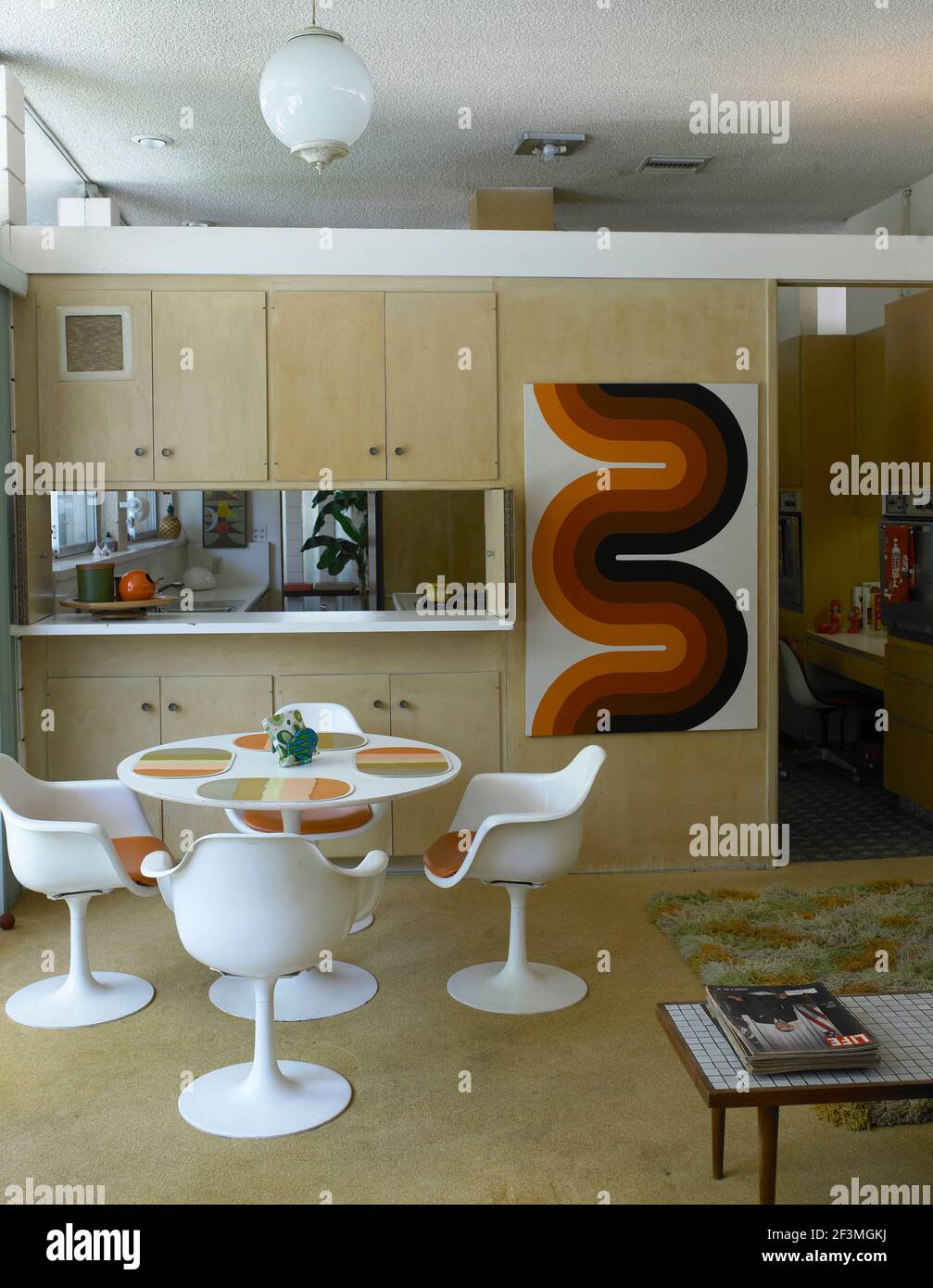 Vintage table and chairs in 60s styled California home, USA Stock Photo ...