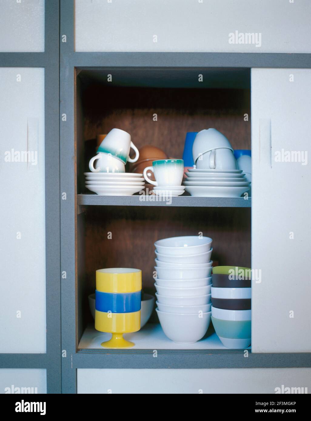 Crockery in storage cupboards, USA Stock Photo - Alamy