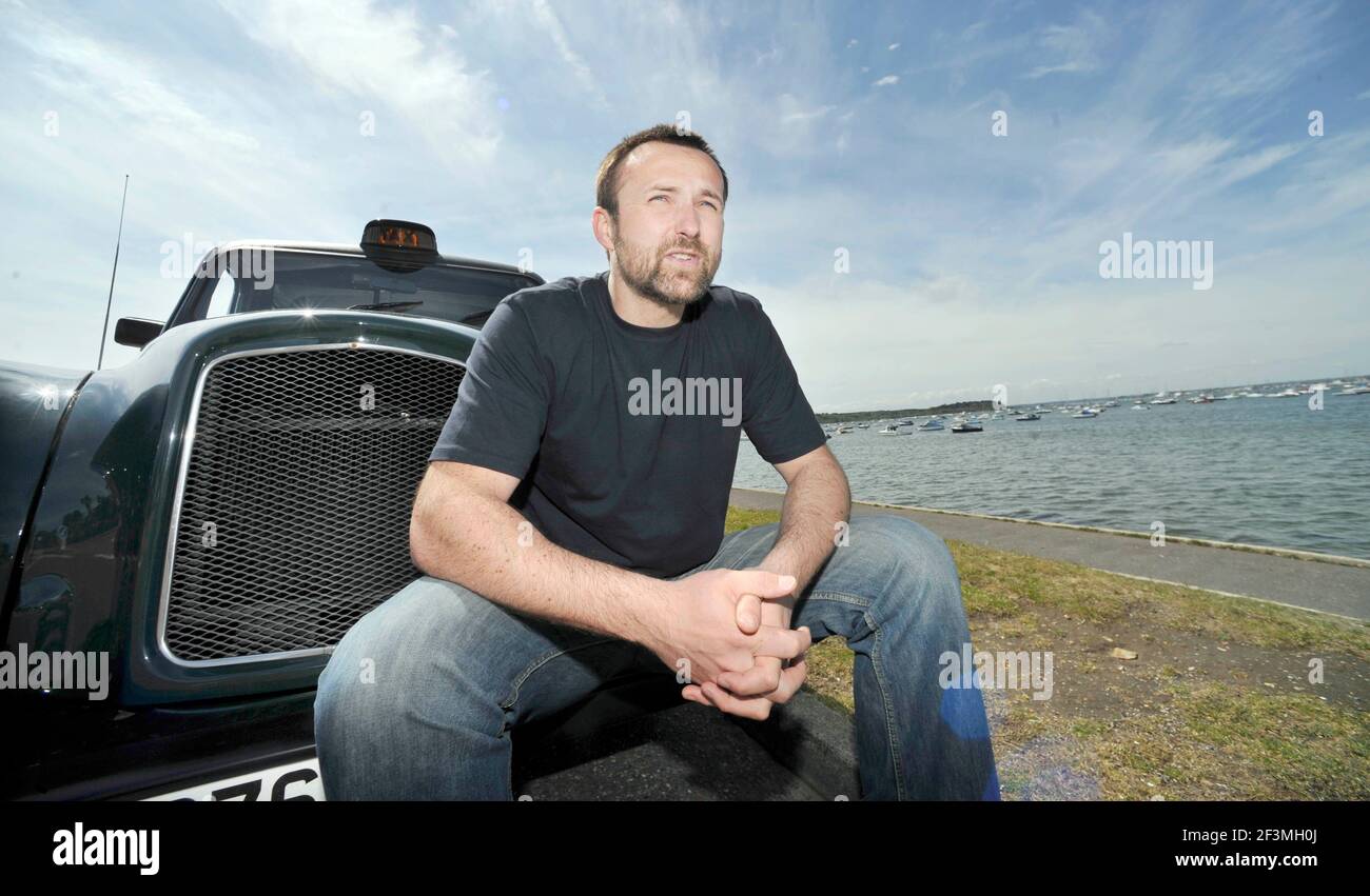 EX FOOTBALLER JIMMY GLASS WITH ONE OF HIS CABS IN POOLE. 29/4/09 ...