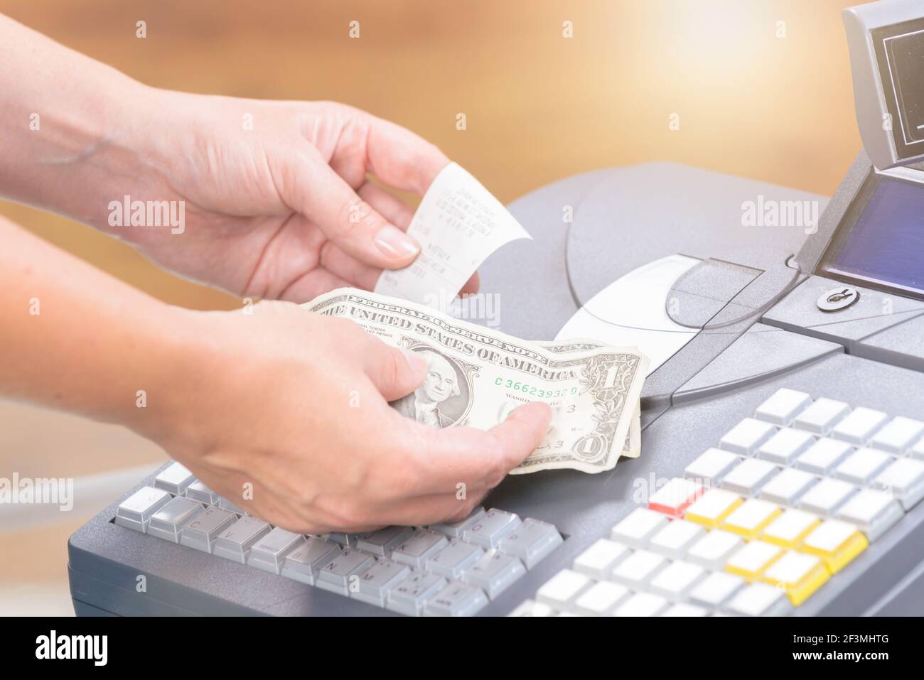 Cashier using cash register hi-res stock photography and images - Alamy
