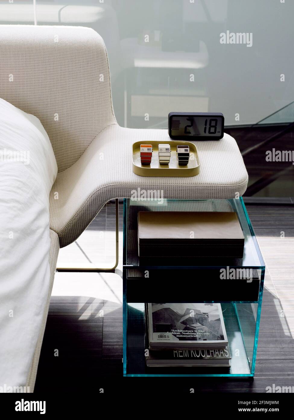 Blue plastic table beside bed in USA home Stock Photo - Alamy