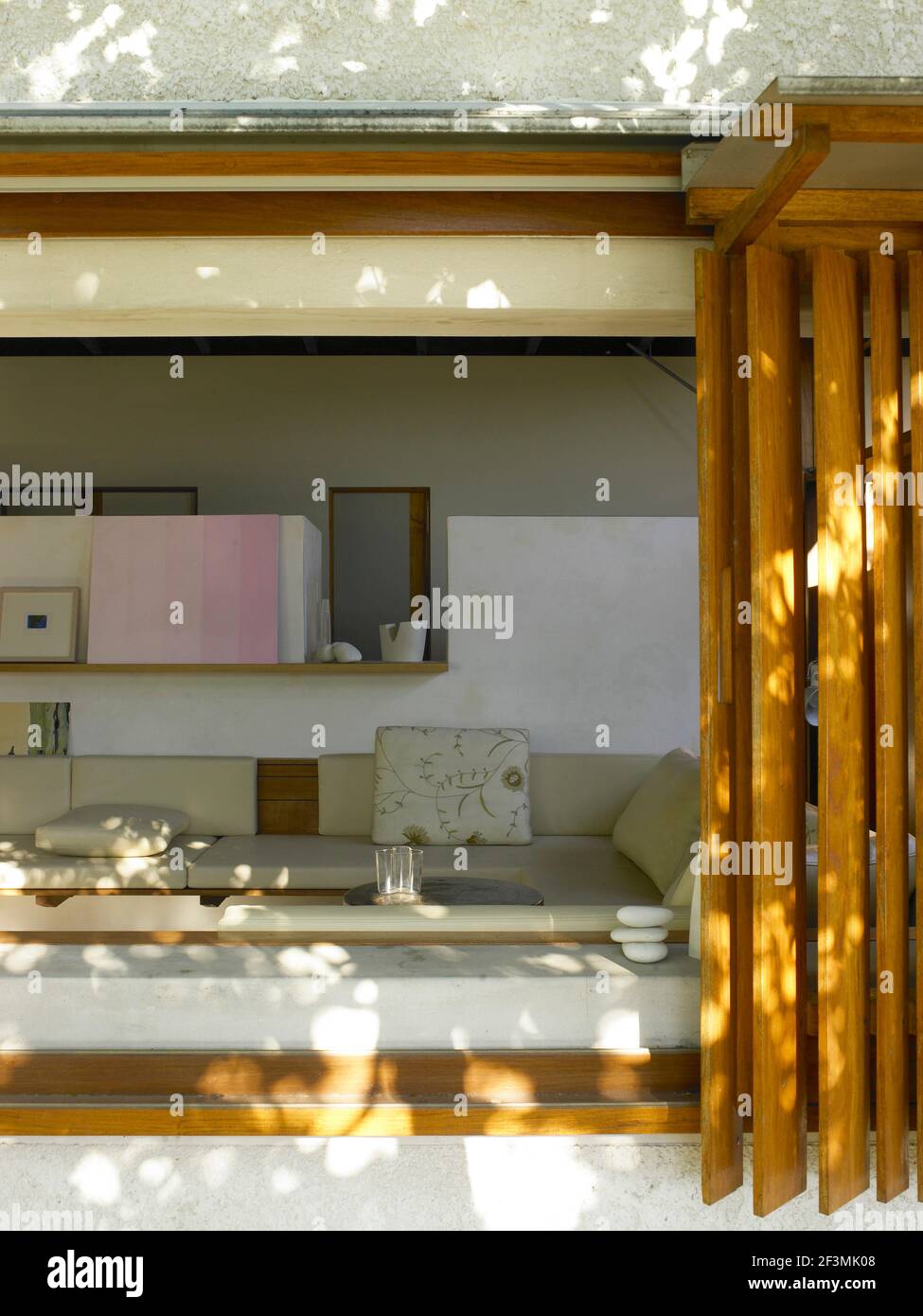 View through window into the living room of Australian home Stock Photo ...