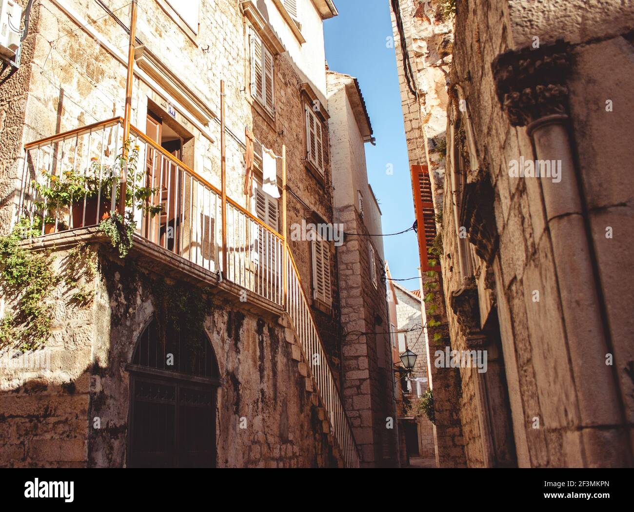 Beautiful street with flowers in the Hvar town, Hvar island, Dalmatia ...