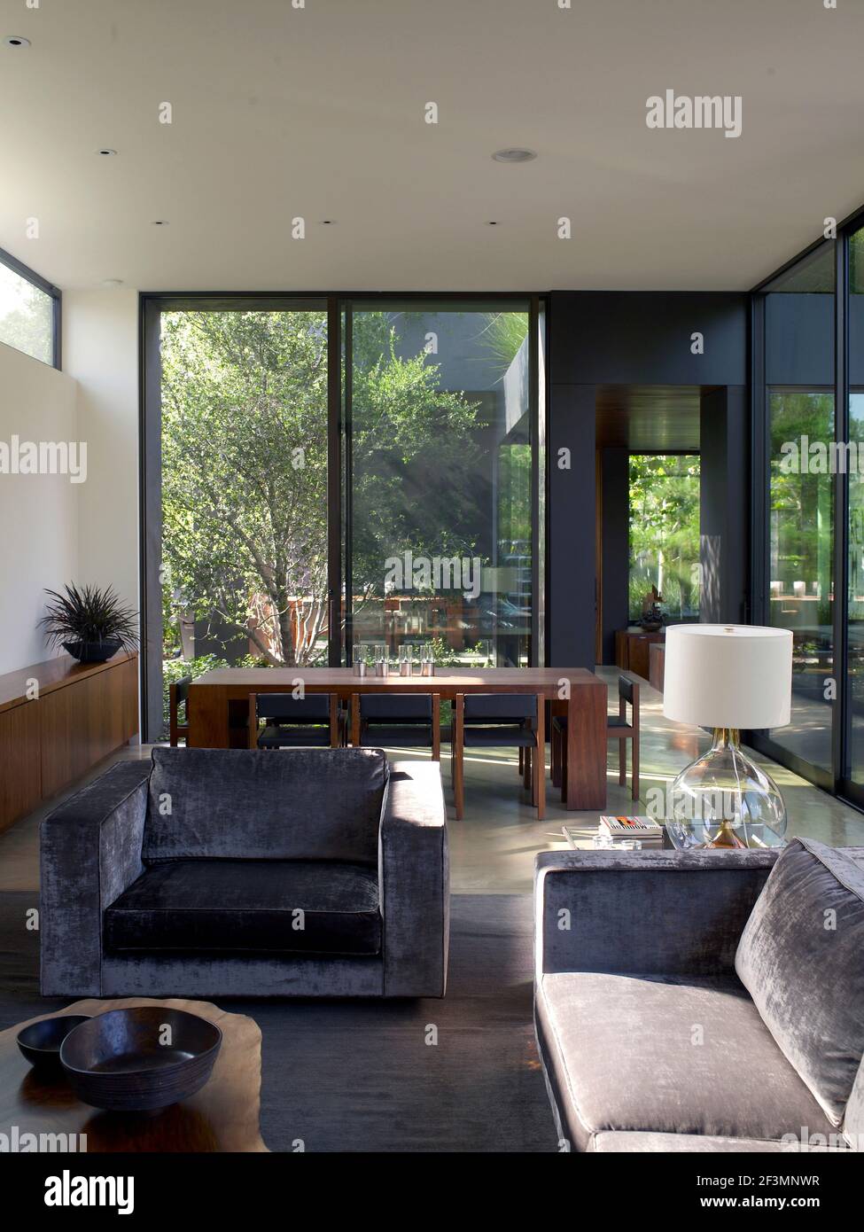 Seating and dining area in open plan room in USA home Stock Photo - Alamy