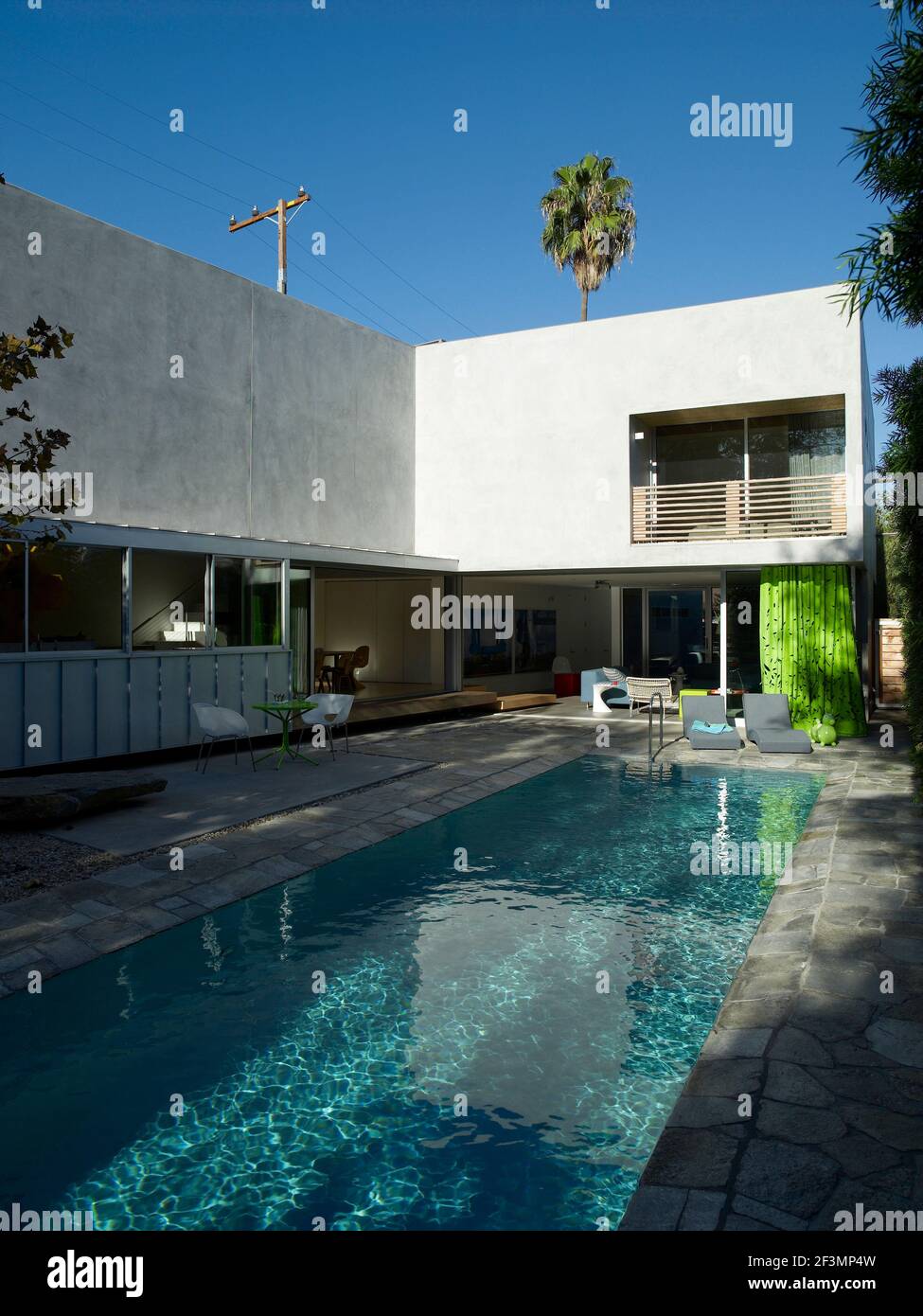Exterior of modern USA house with lap pool Stock Photo - Alamy