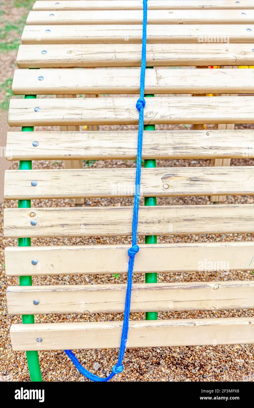 Kids rope bridge made by wooden planks Stock Photo - Alamy