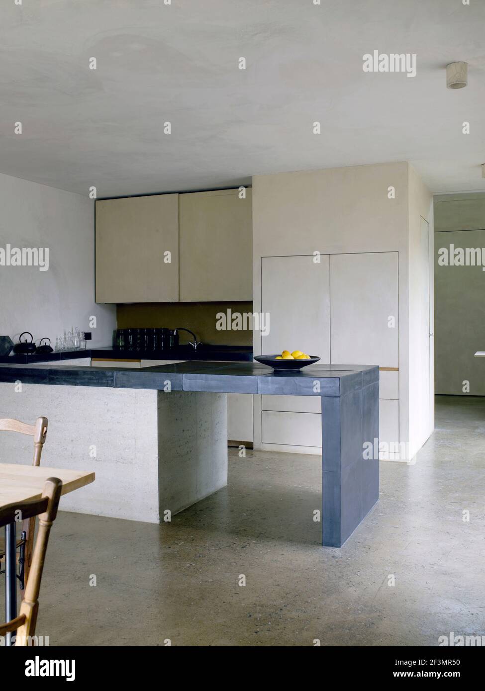 Kitchen with breakfast bar in Austrian home Stock Photo - Alamy