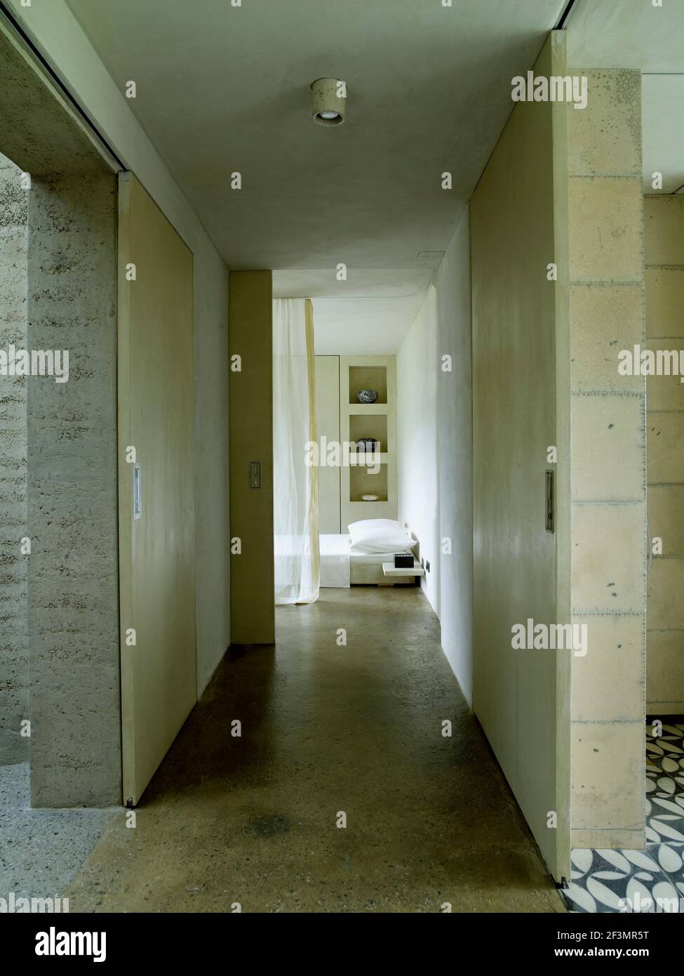 View from hallway into bedroom of Austrian home Stock Photo - Alamy