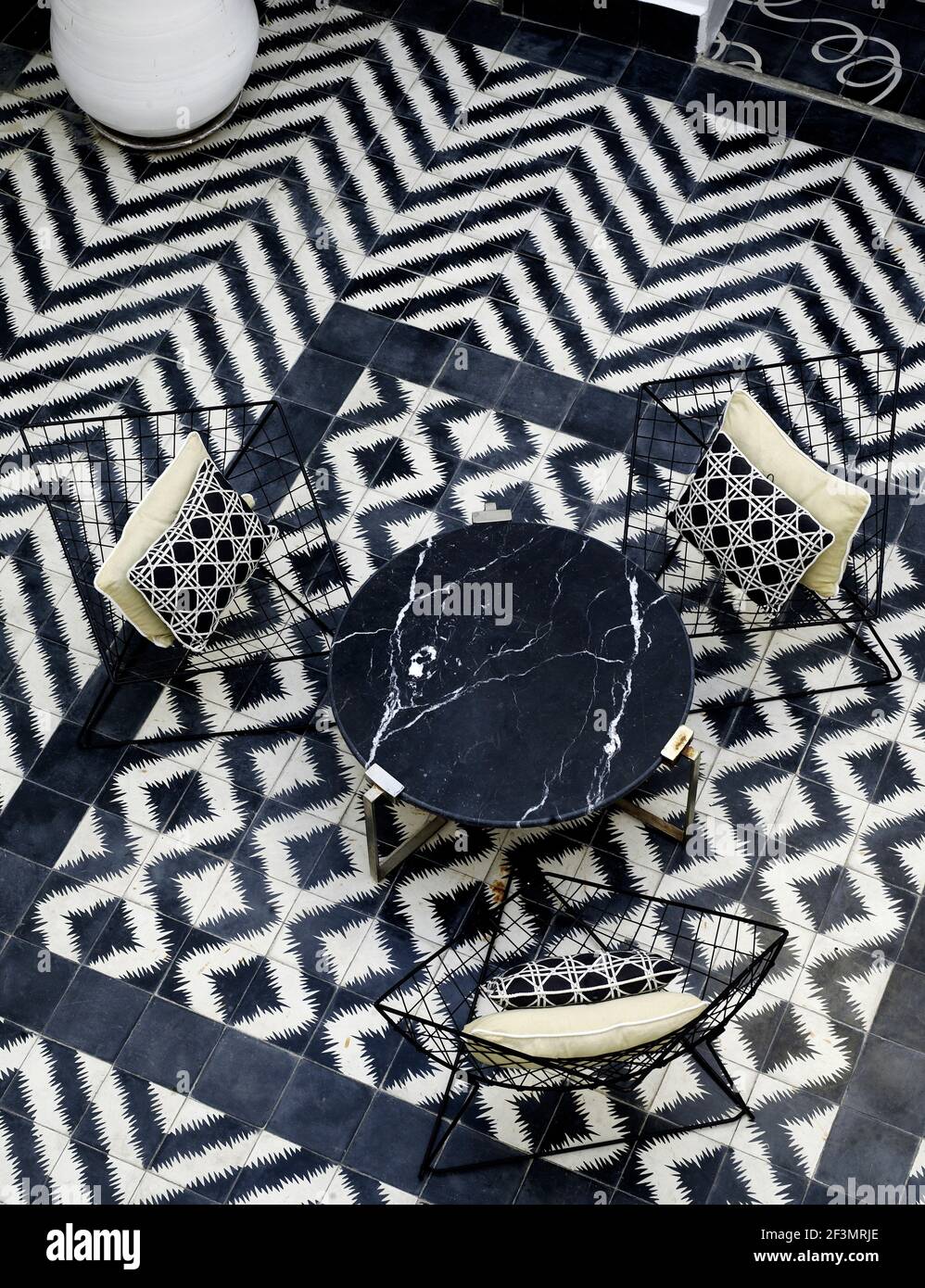 Tables chairs on tiled hi-res stock photography and images - Alamy