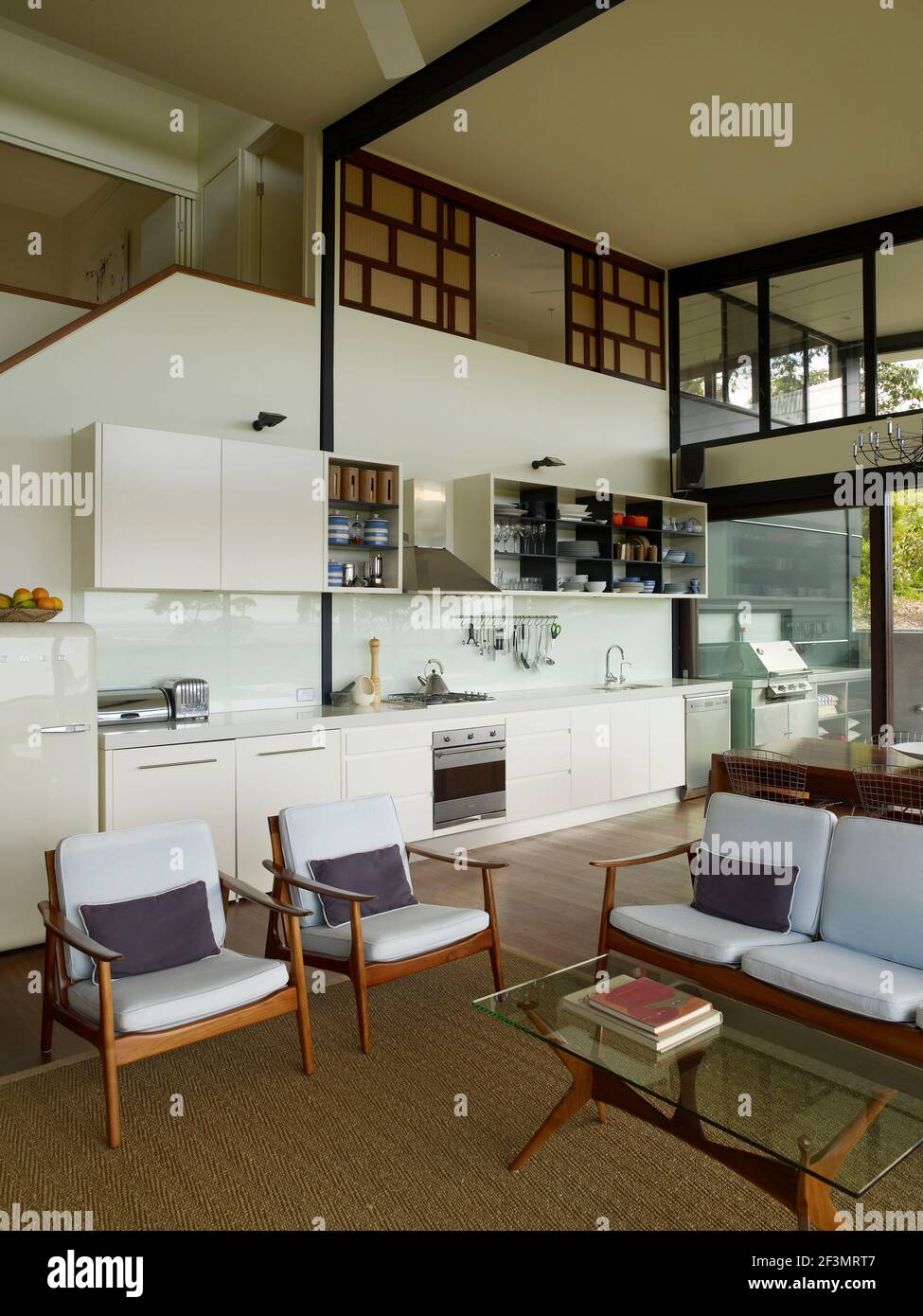 Seating area in spacious open plan kitchen in Australian home Stock ...