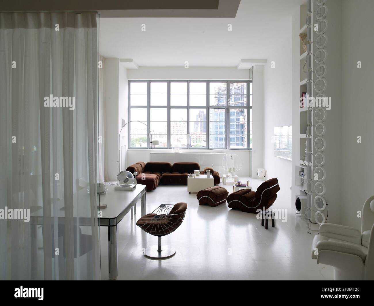 Seating in spacious open plan living room in USA home Stock Photo - Alamy