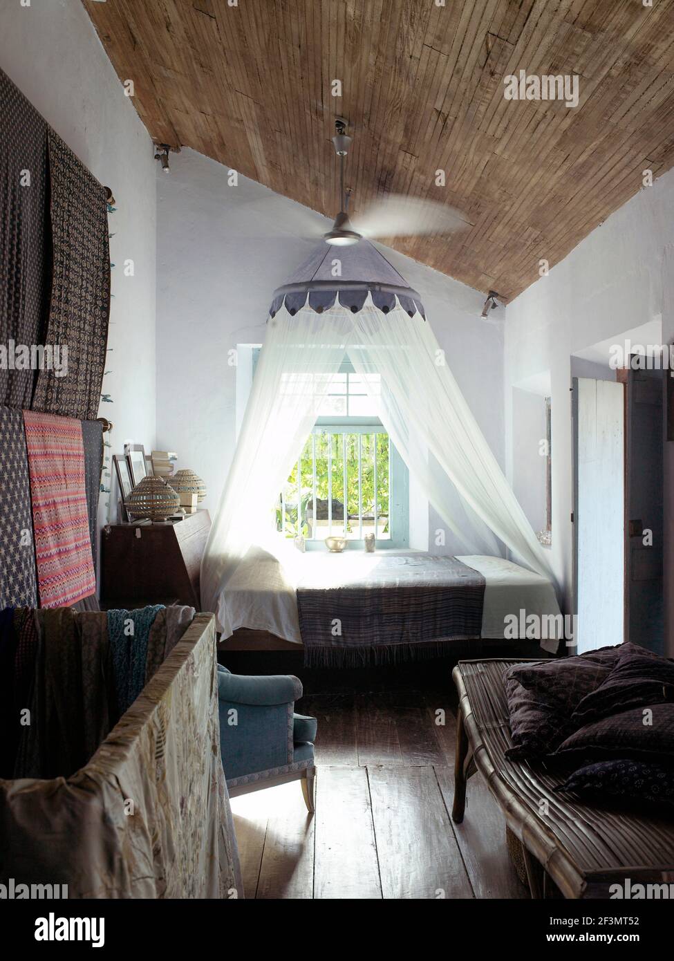 Bed with canopy in country style bedroom, Sri Lanka Stock Photo - Alamy