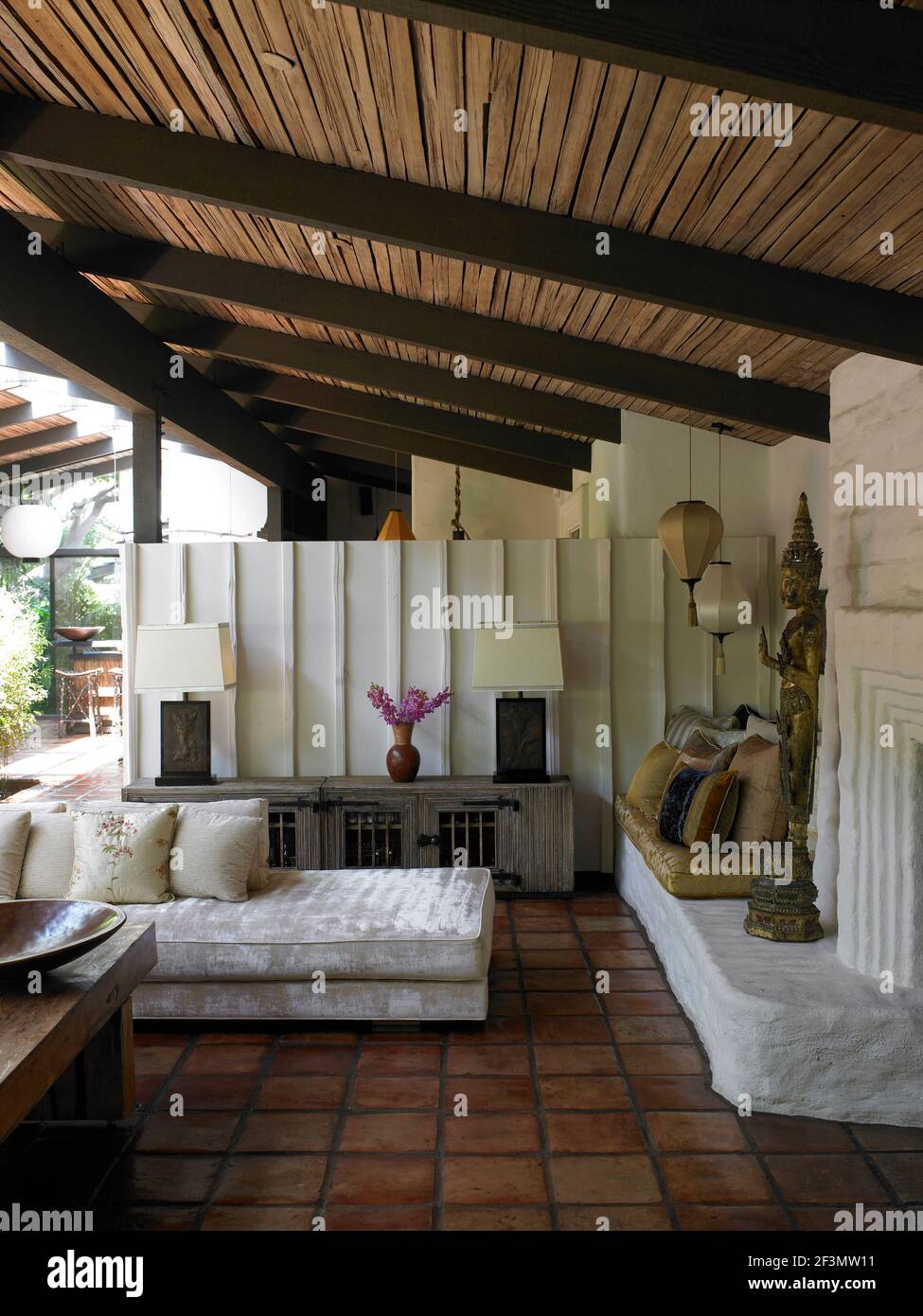 Seating on shaded terrace in USA home Stock Photo - Alamy