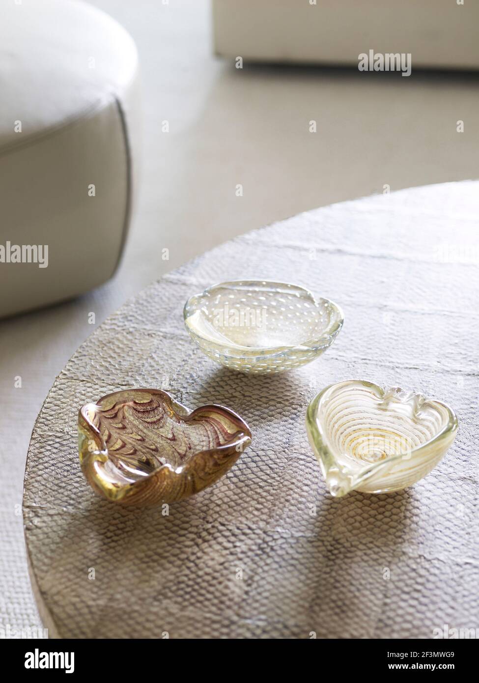 Glass ashtrays on table in Brazilian home Stock Photo - Alamy