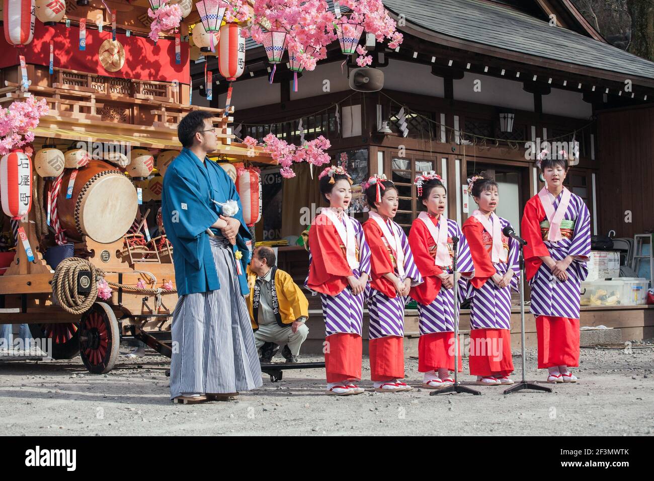 Young Japanese females wearing kimonos singing at the annual Yayoi ...