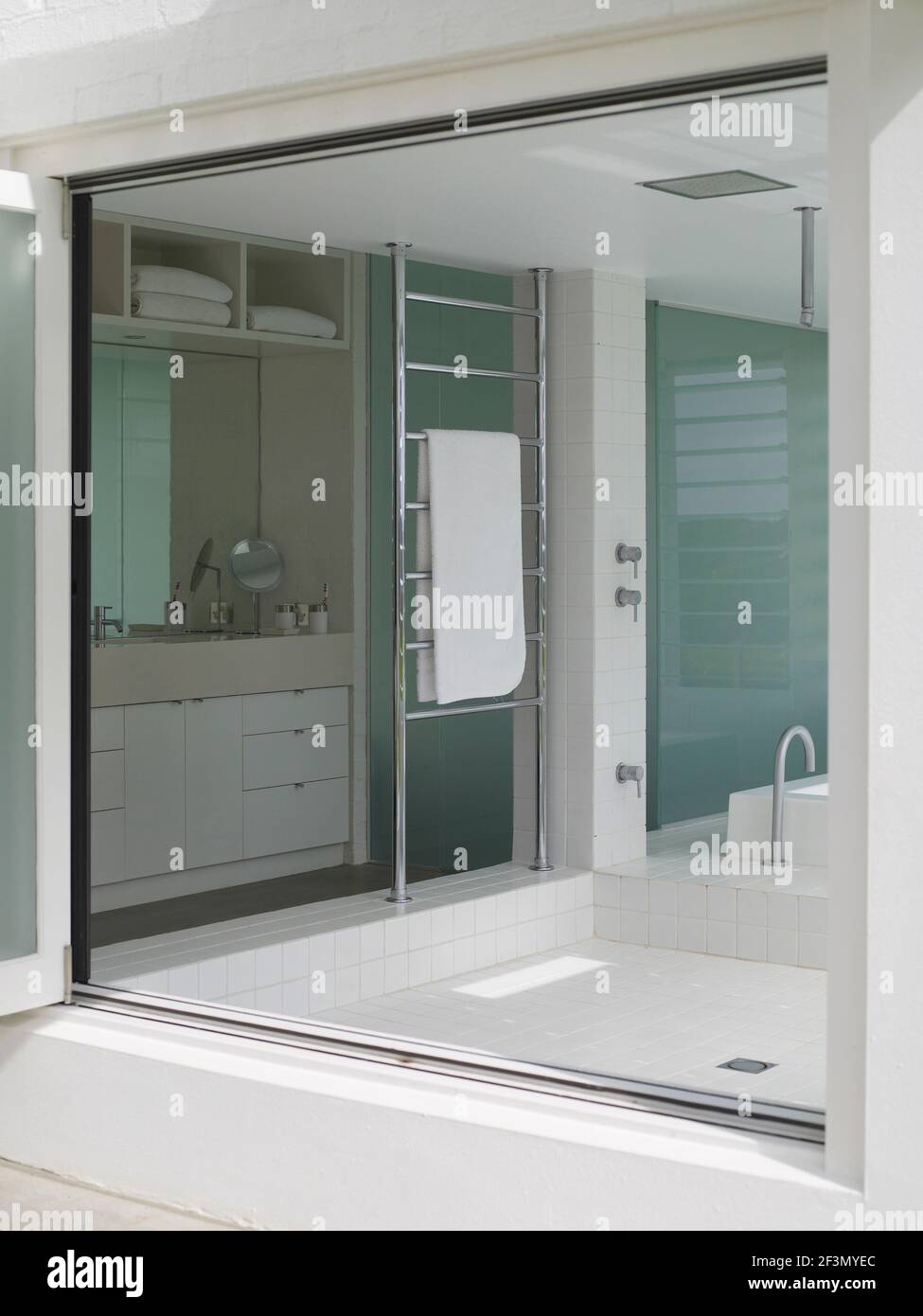 View through window to wet room in Australian home Stock Photo - Alamy