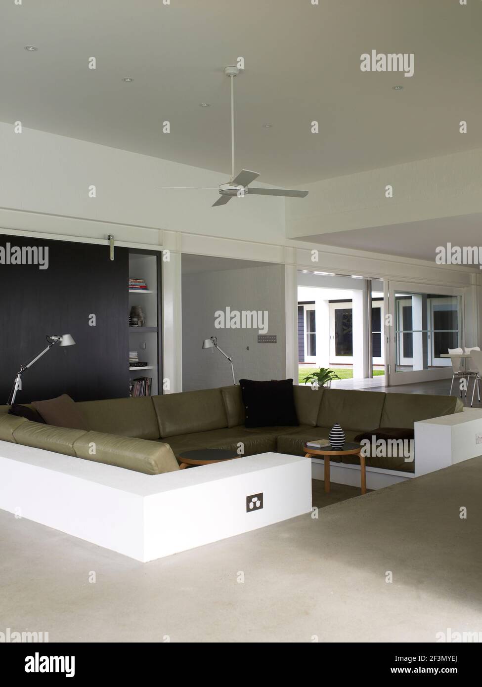 Sunken seating in living room in Australian home Stock Photo - Alamy