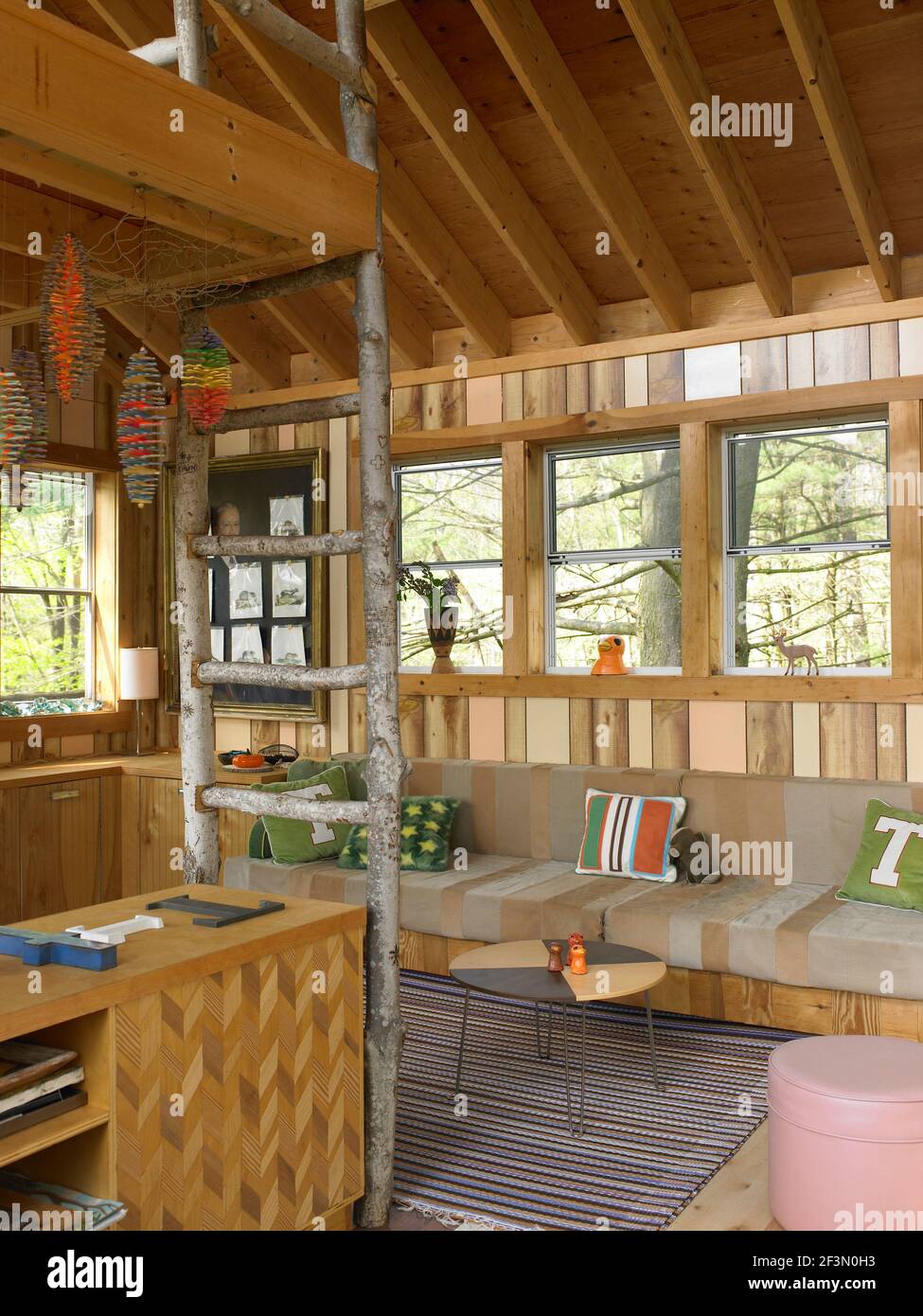 Seating outside wood cabin USA home Stock Photo - Alamy