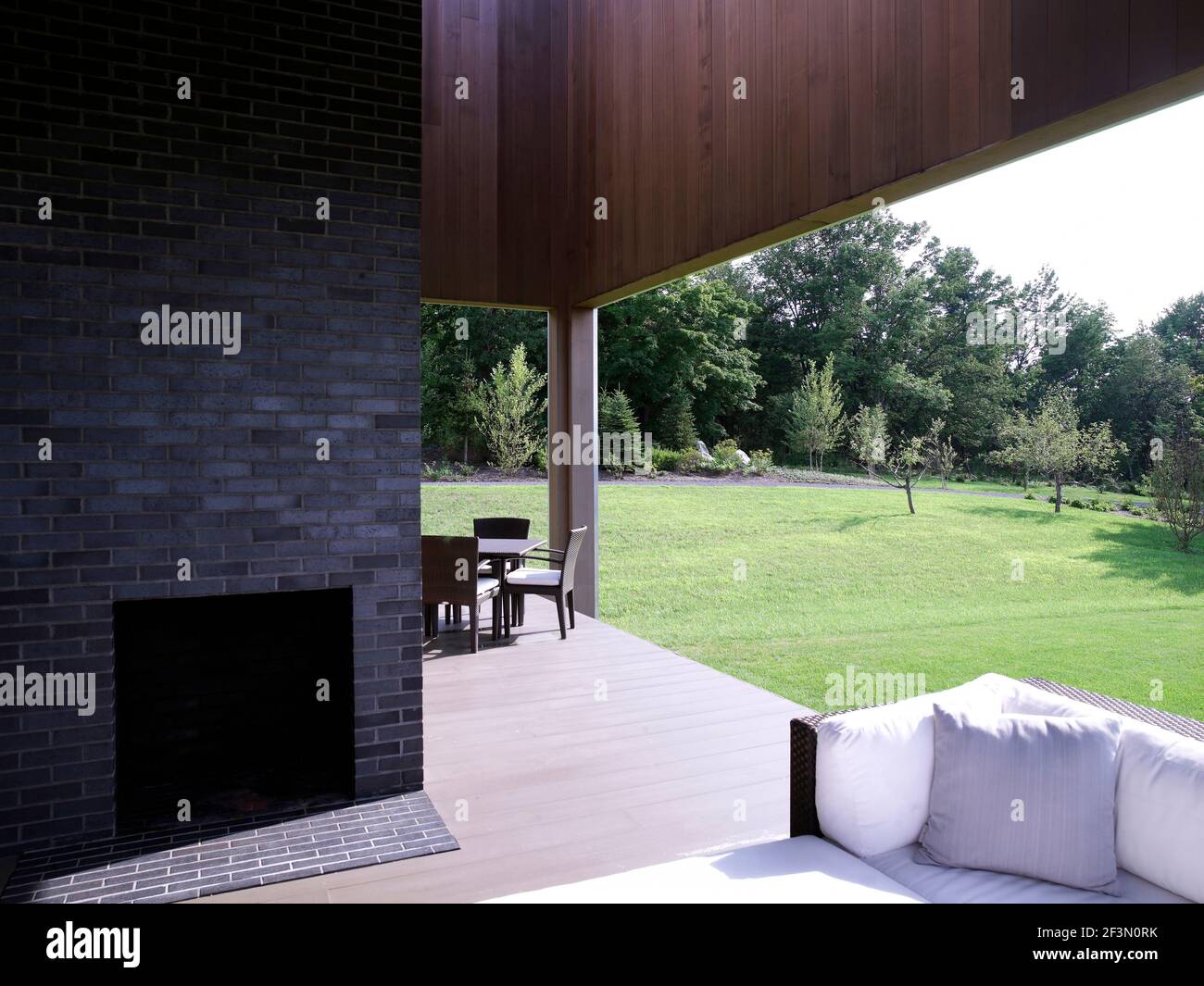 Seating on shaded terrace of USA home Stock Photo - Alamy