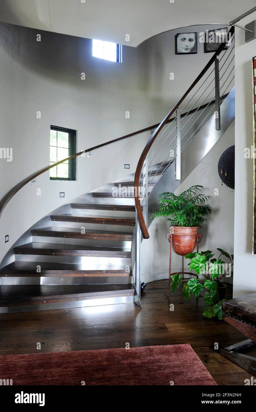 Steel staircase in hallway of USA home Stock Photo - Alamy
