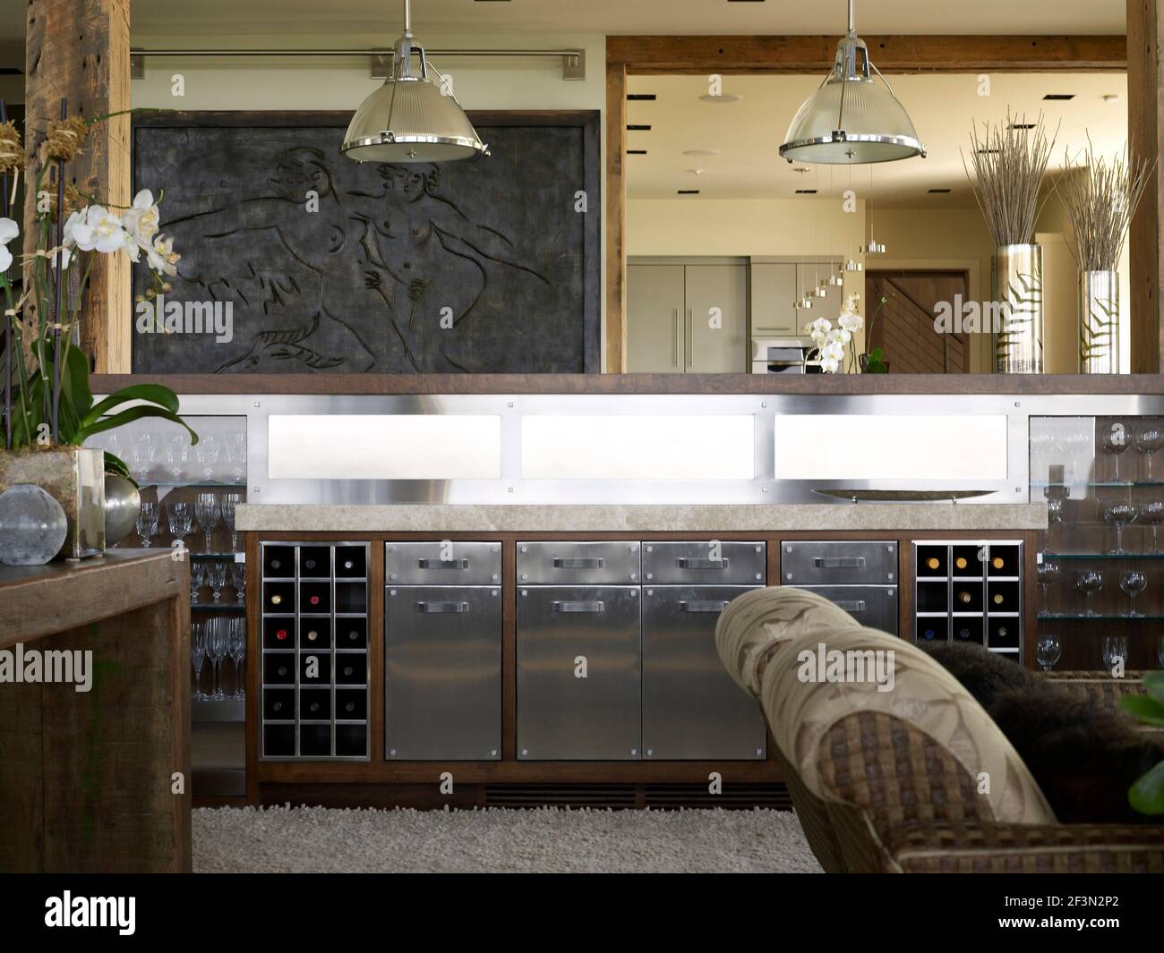 Pendant lights above bar in living room in USA home Stock Photo - Alamy