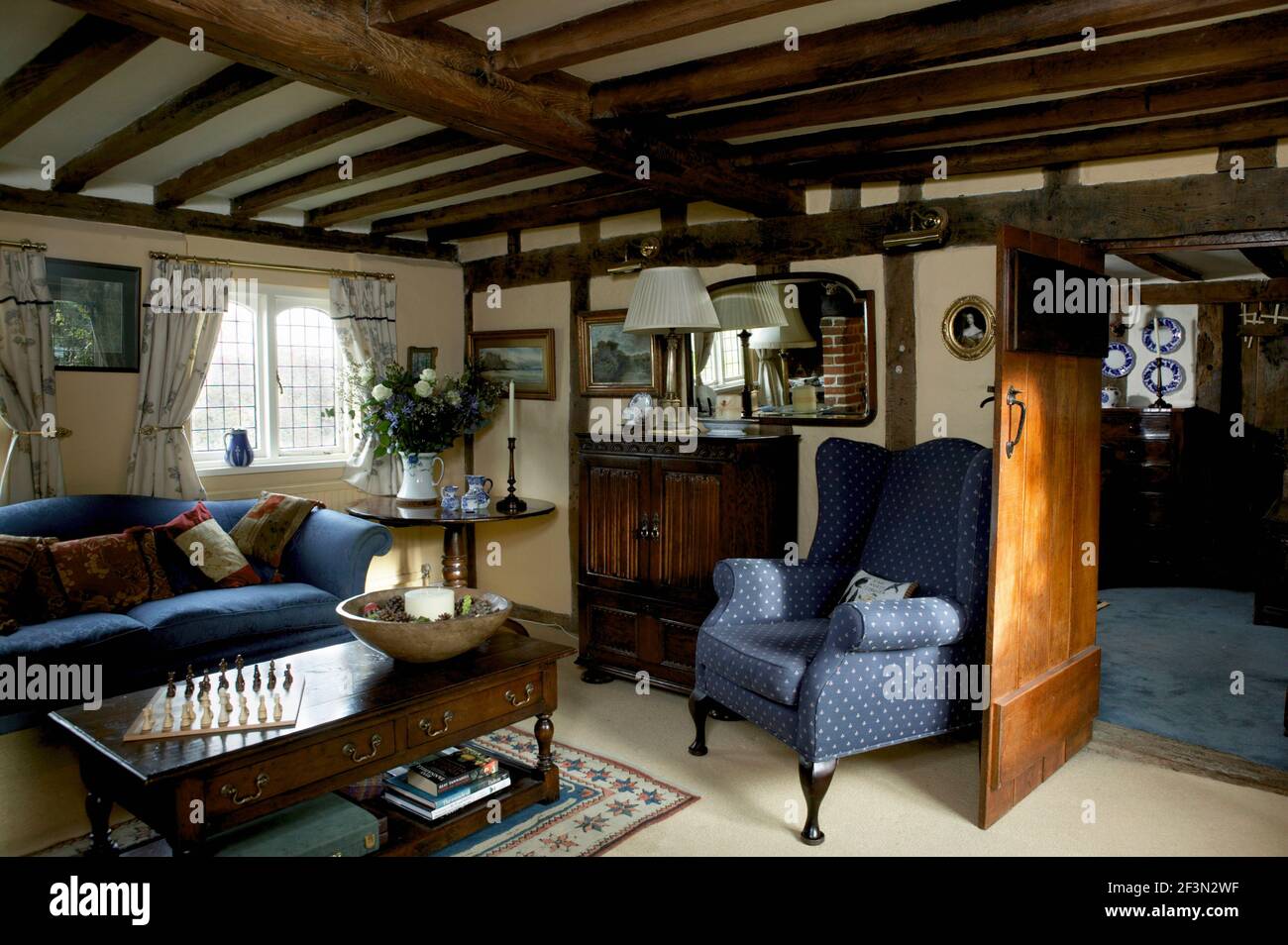 Beamed Tudor sitting room with traditional furnishings Stock Photo - Alamy