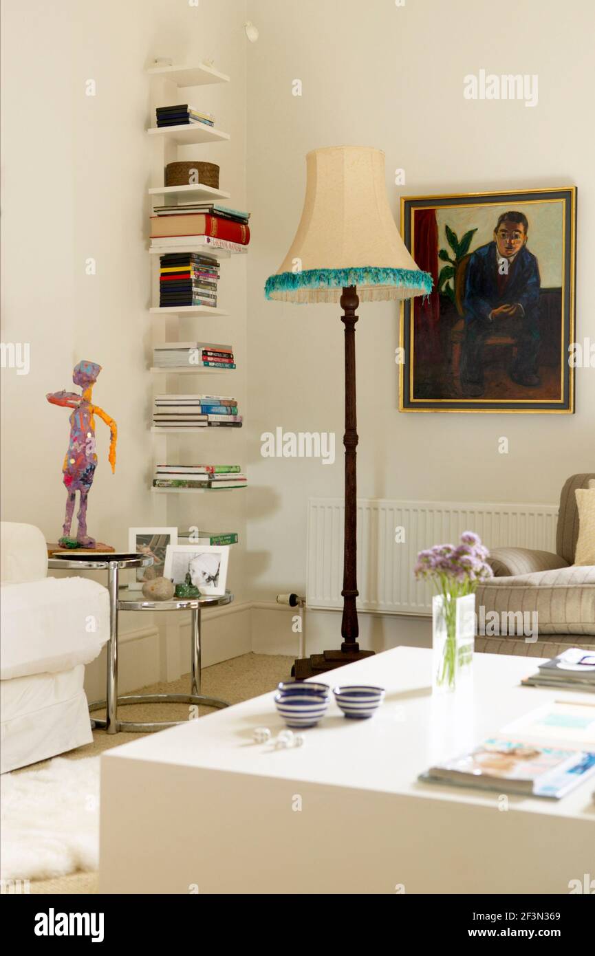 Living room looking across coffee table to lampshade Stock Photo - Alamy