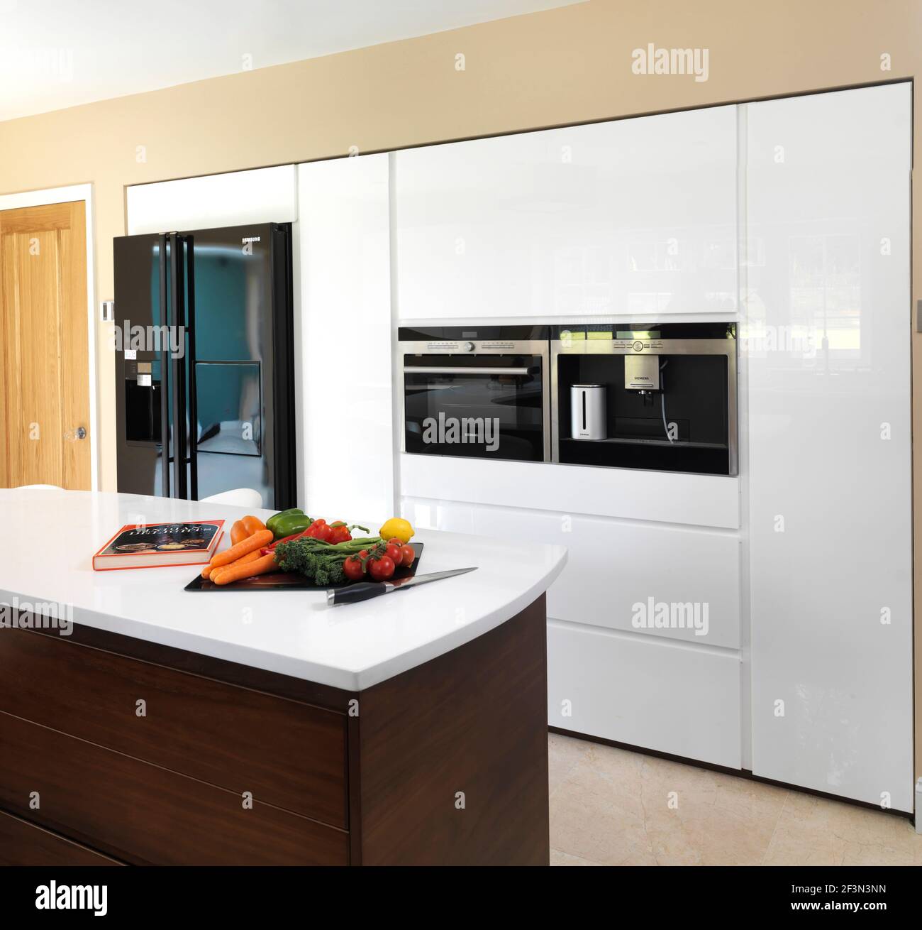 Island unit in modern kitchen, UK home Stock Photo - Alamy
