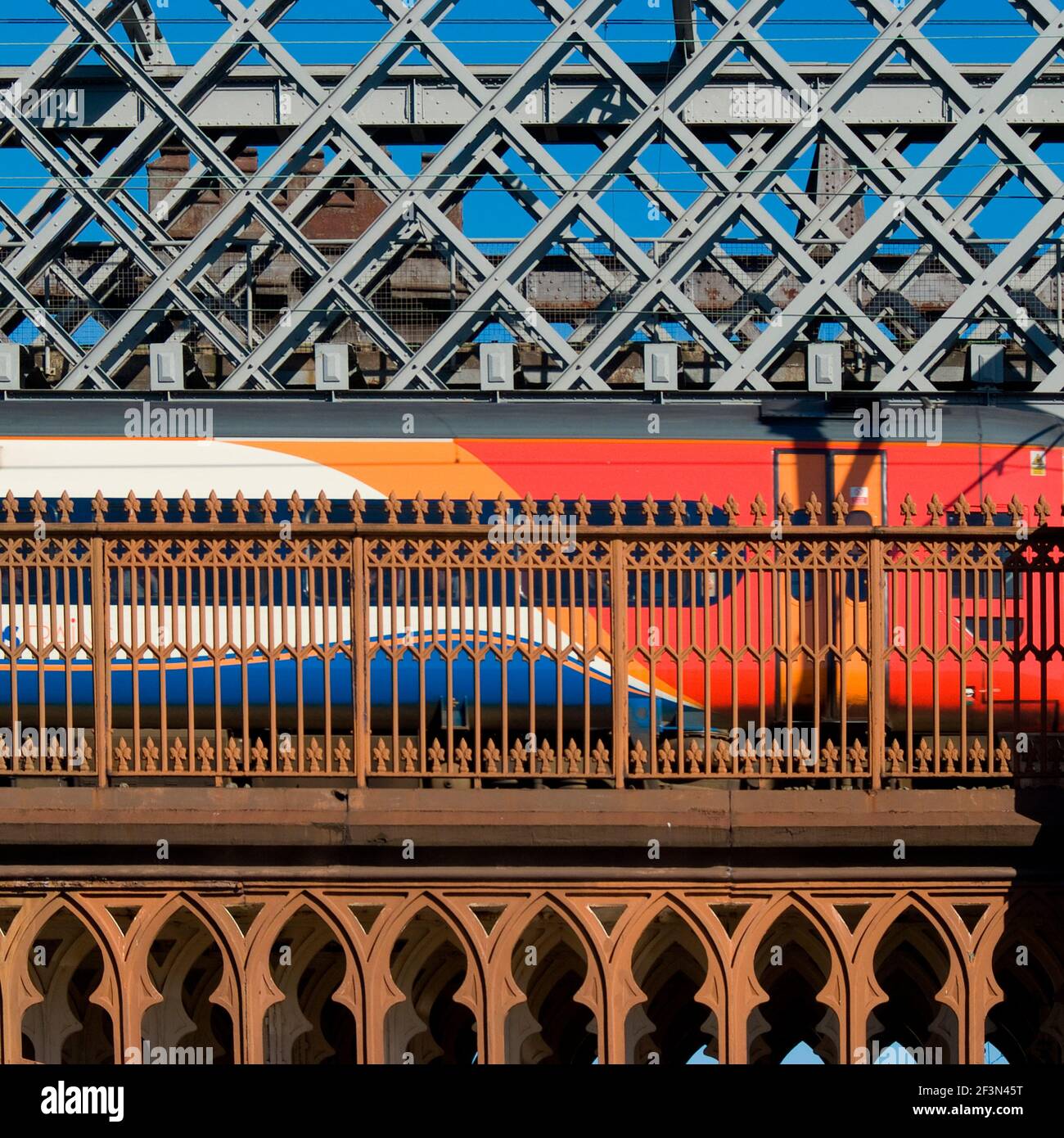 Train crossing the Southern Viaduct Bridge Castlefield Manchester ...