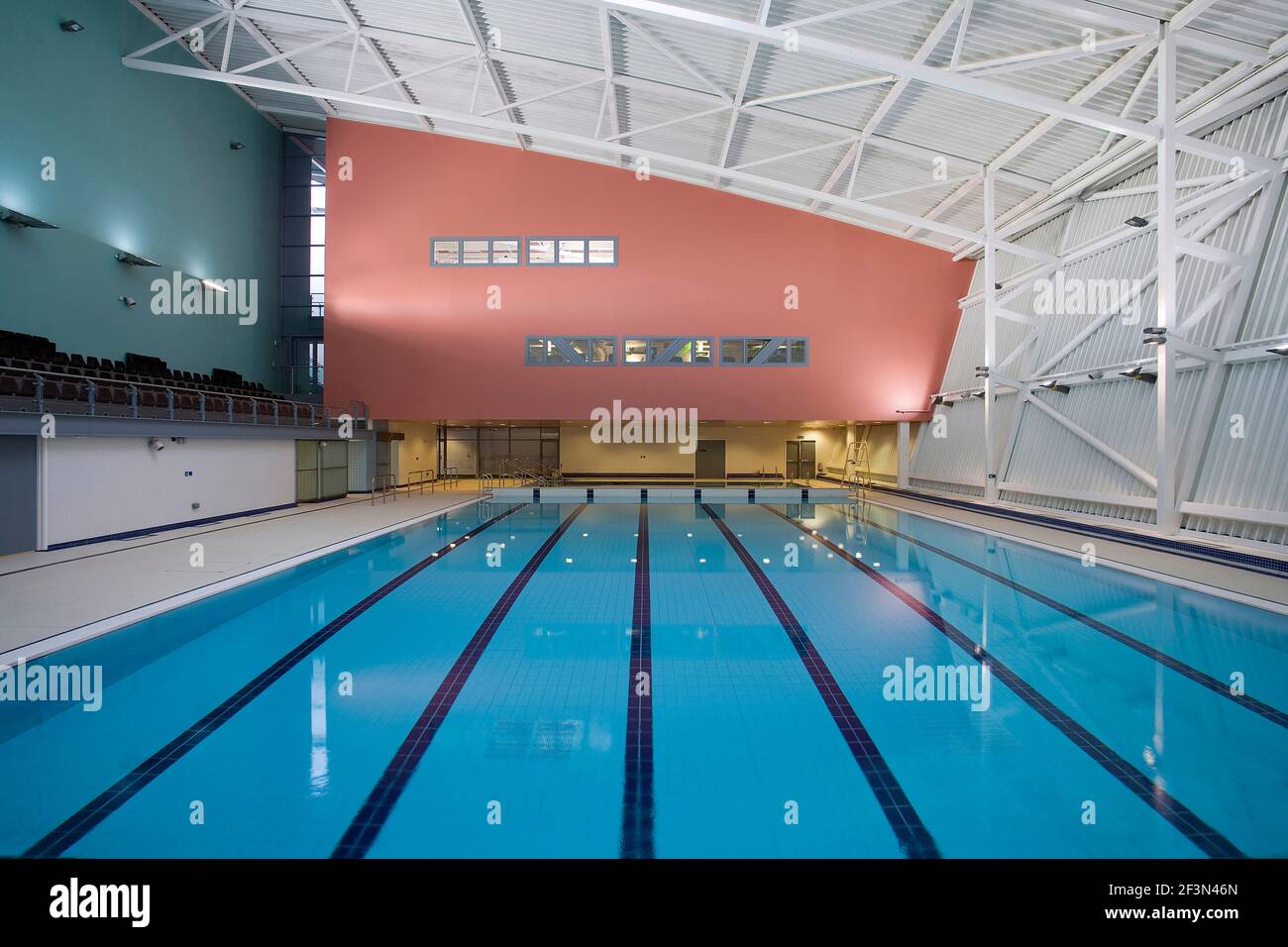 Interior of swimming pool building Stock Photo - Alamy