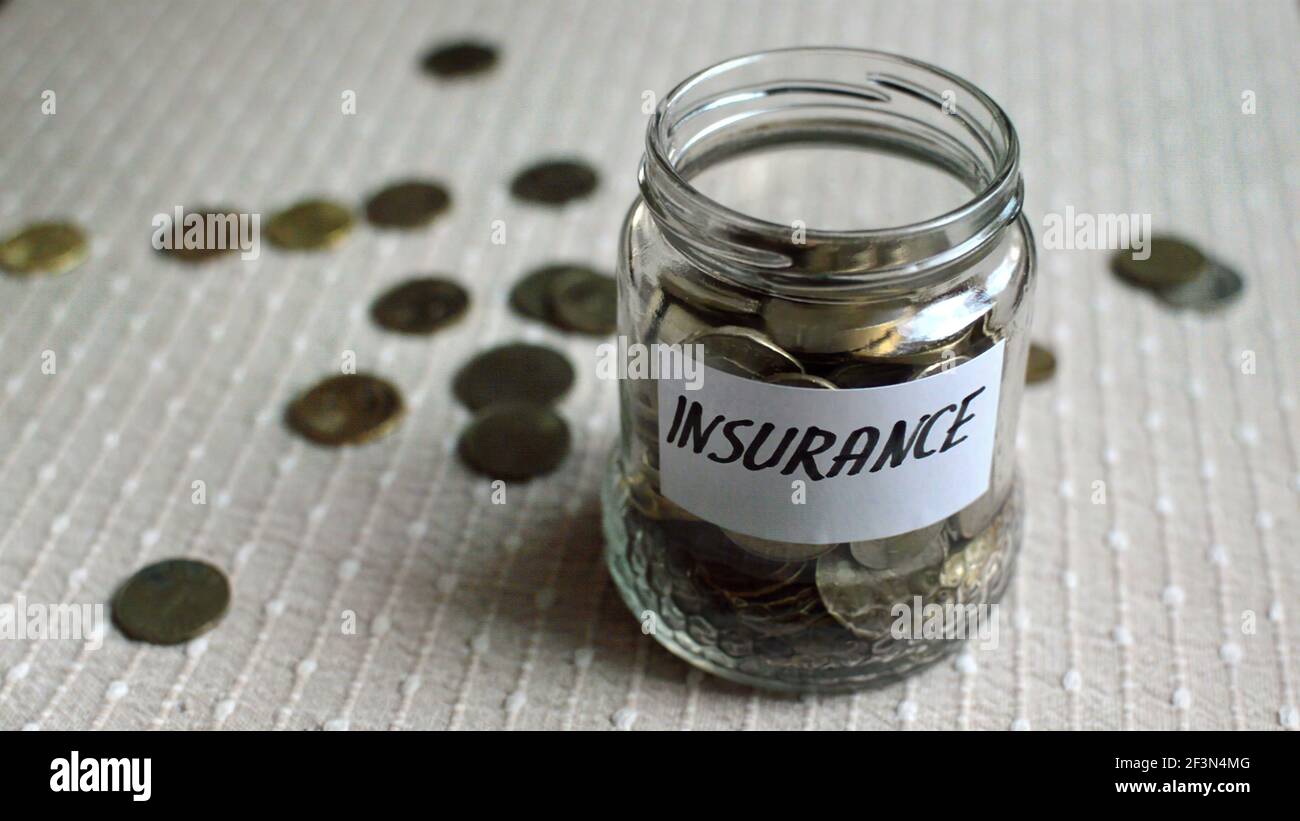 3D illustration - Coins filling in jar labeled for insurance Stock ...
