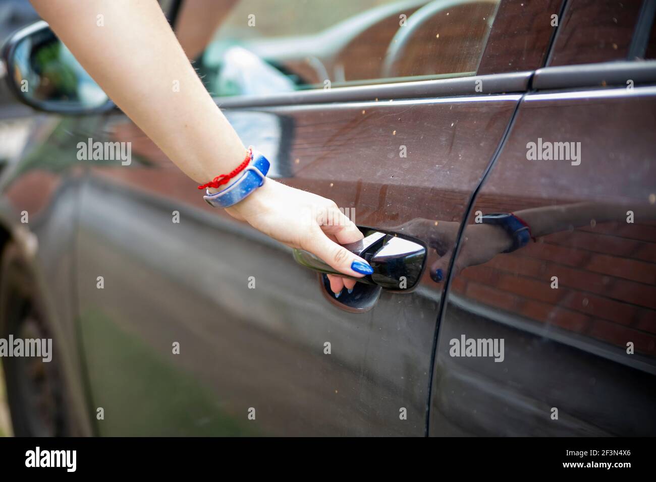Car door and handle and hand and glove hi-res stock photography and ...