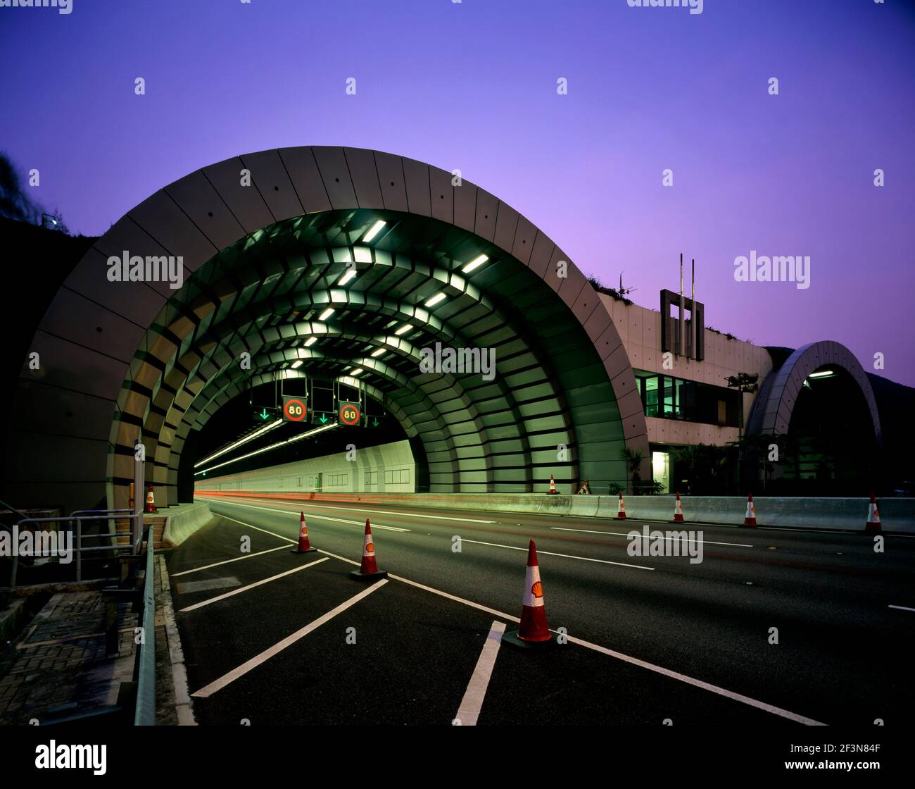 ACP. Two West Portals of tunnel. Road. Speed limit signs. Night. Lights ...