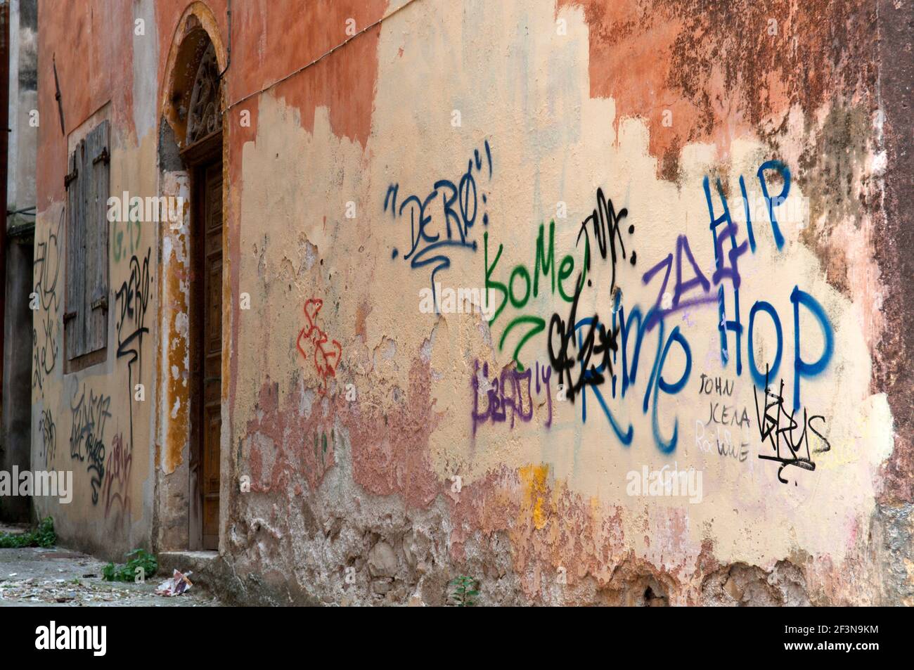 There is graffiti on the walls of streets in Corfu Town, on many ...