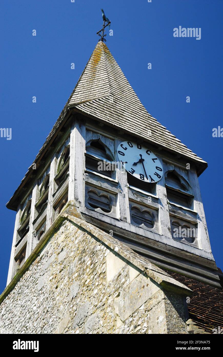 St Andrew's church in the village of Wootton Rivers. The clock displays ...