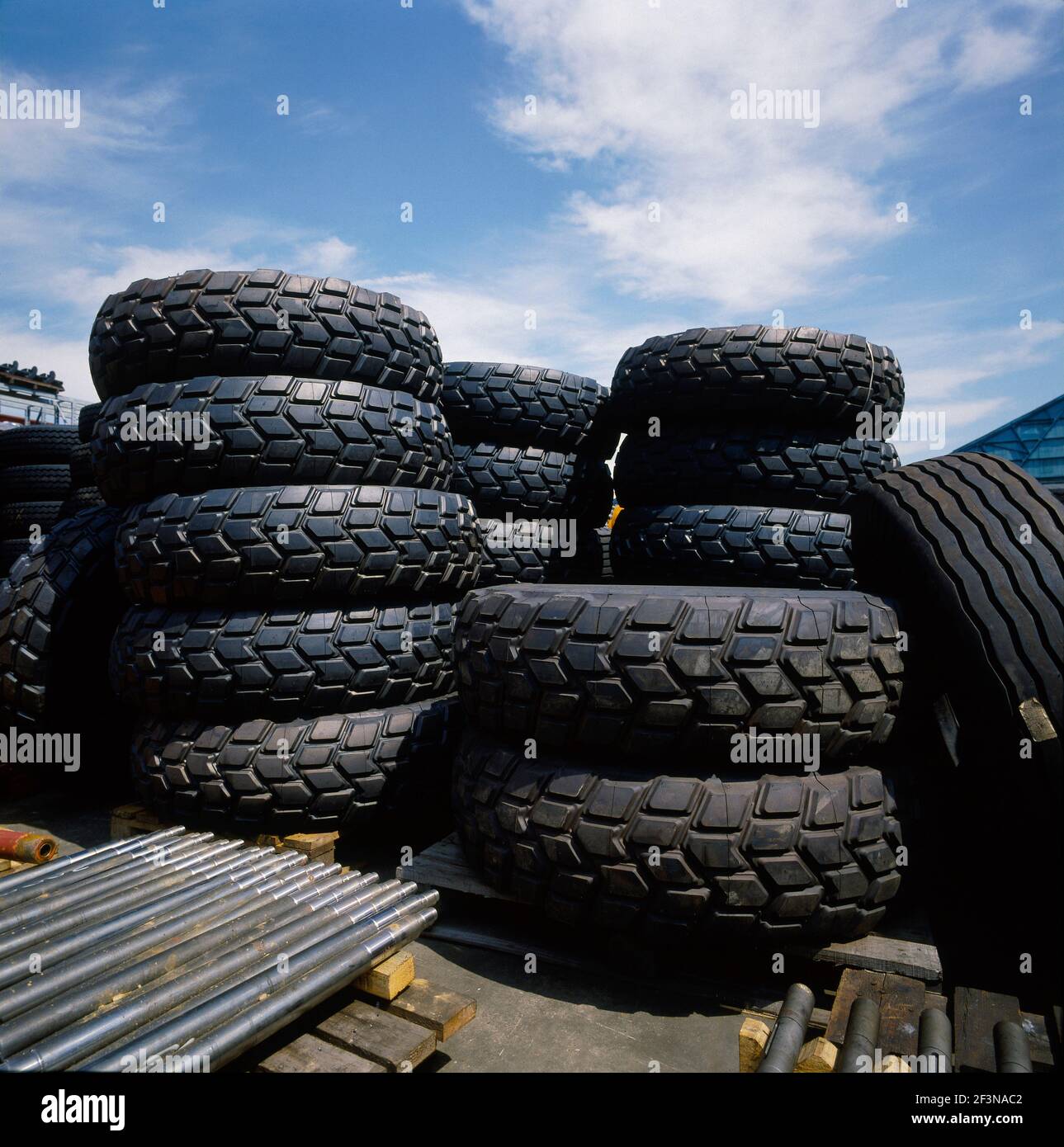 Stack of rubber car tyres collected for recycling Stock Photo - Alamy