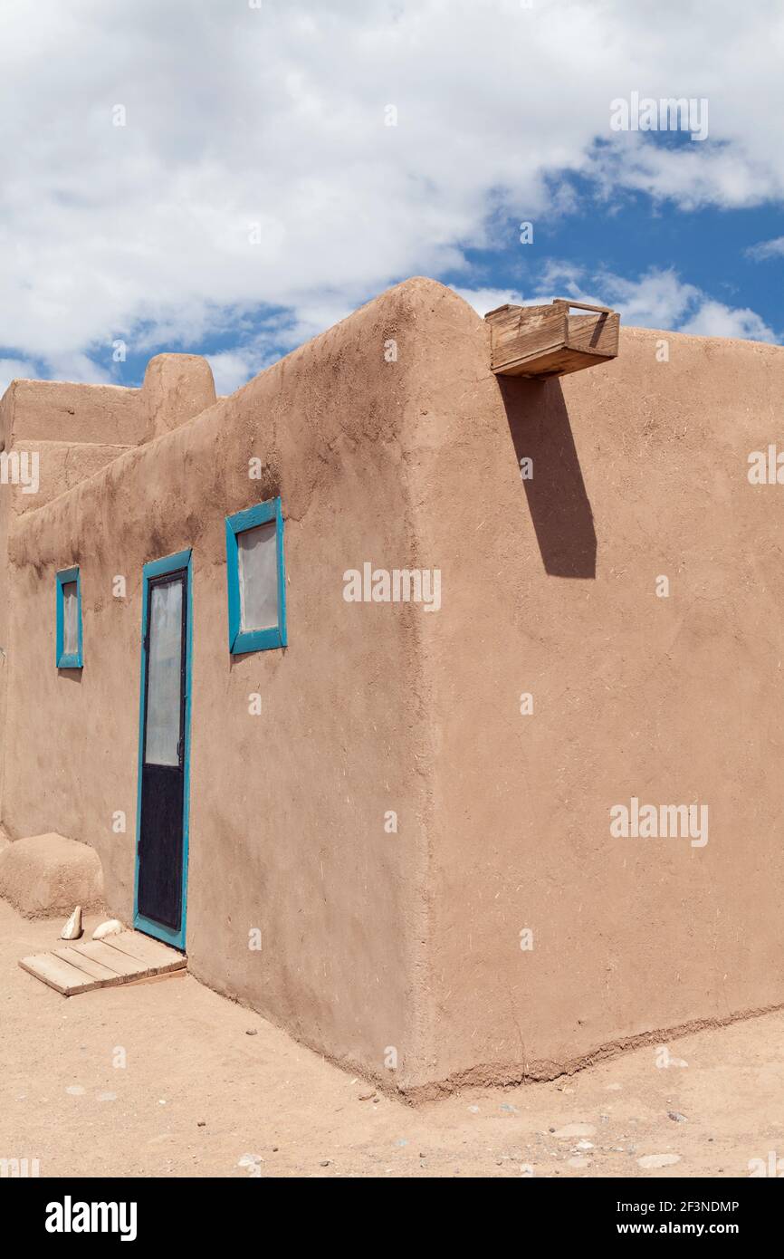 Corner elevation of a traditional adobe house, Taos Pueblo, New Mexico ...